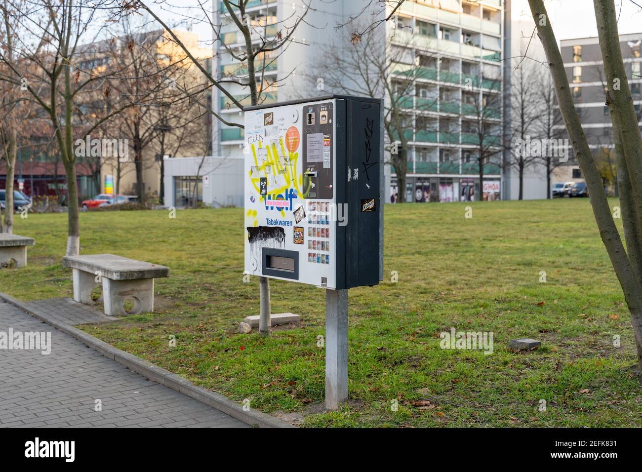 Cigarette vending machine next to a public park and very dirty and ...