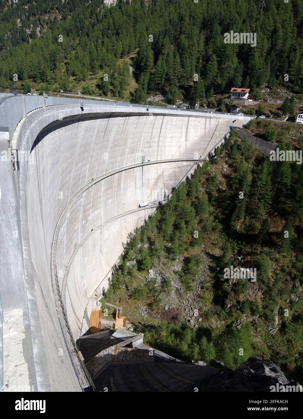 concrete dam on mountain lake Stock Photo - Alamy