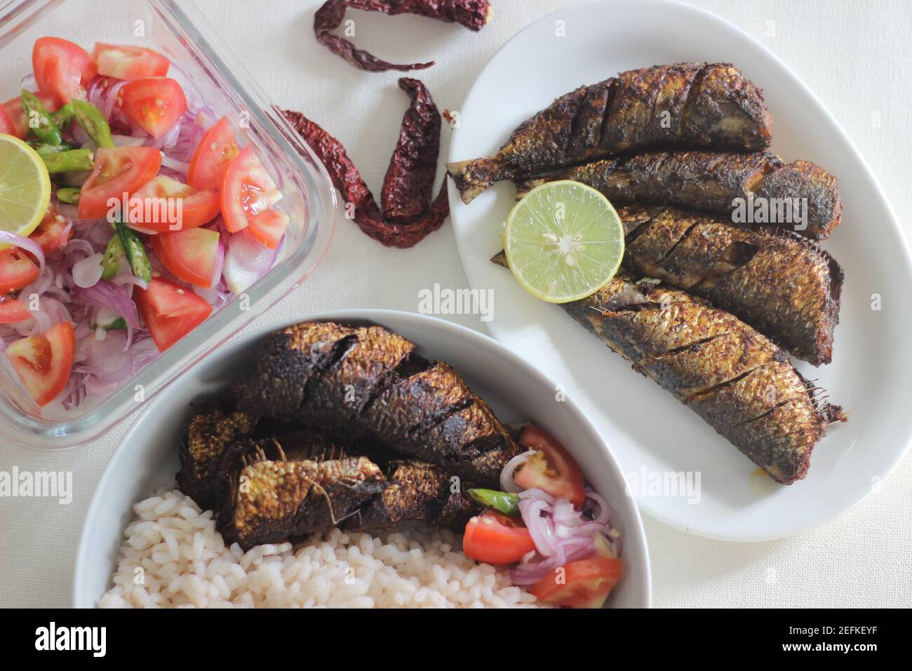 Sardines fry is a traditional Kerala fish dish served for lunch. It is ...
