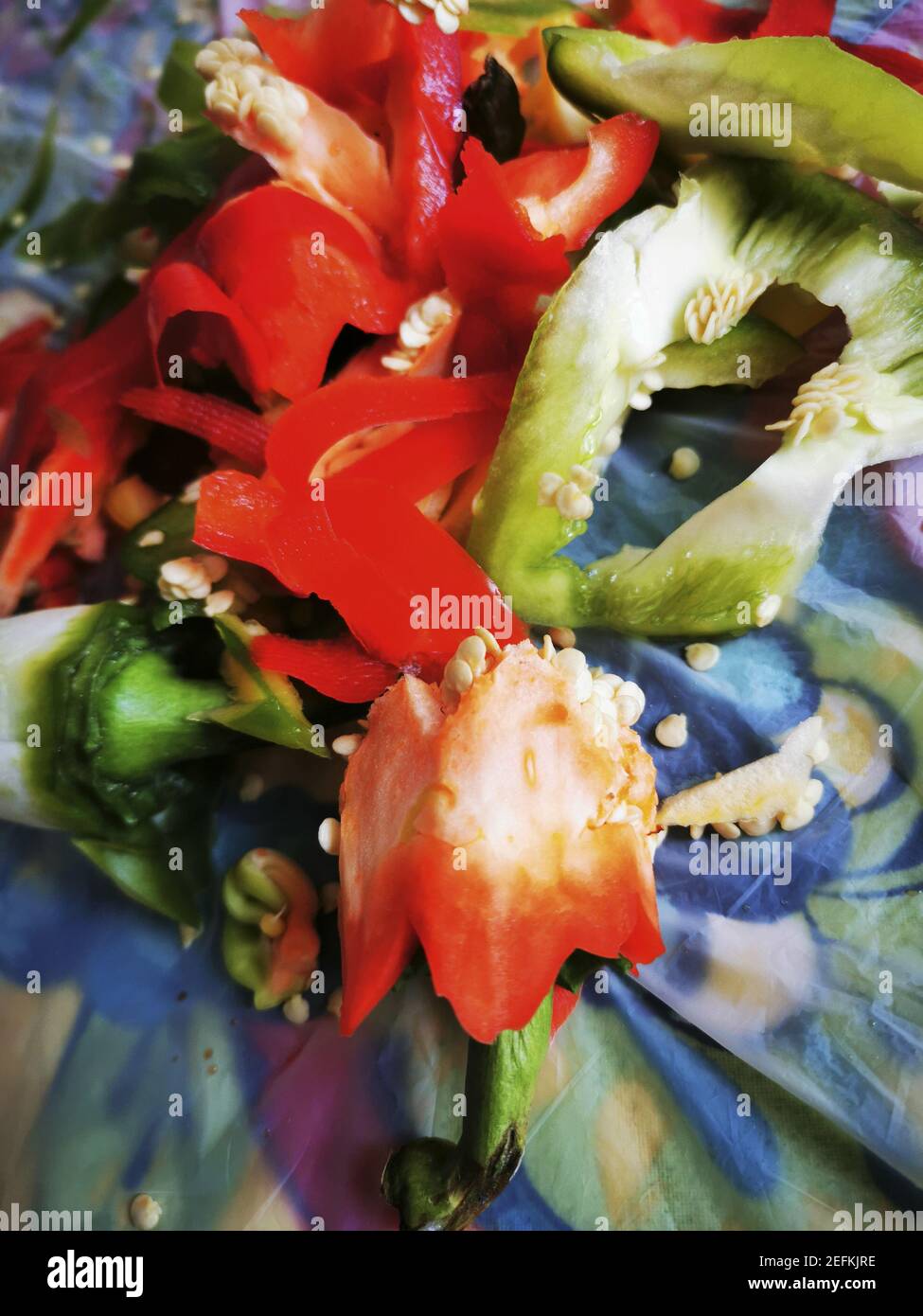 Closeup vertical shot of remnants of colorful sweet pepper with seeds ...