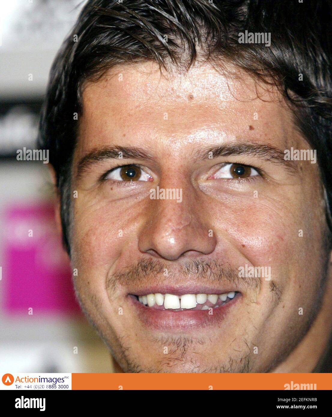 Emre belozoglu signing hi-res stock photography and images - Alamy