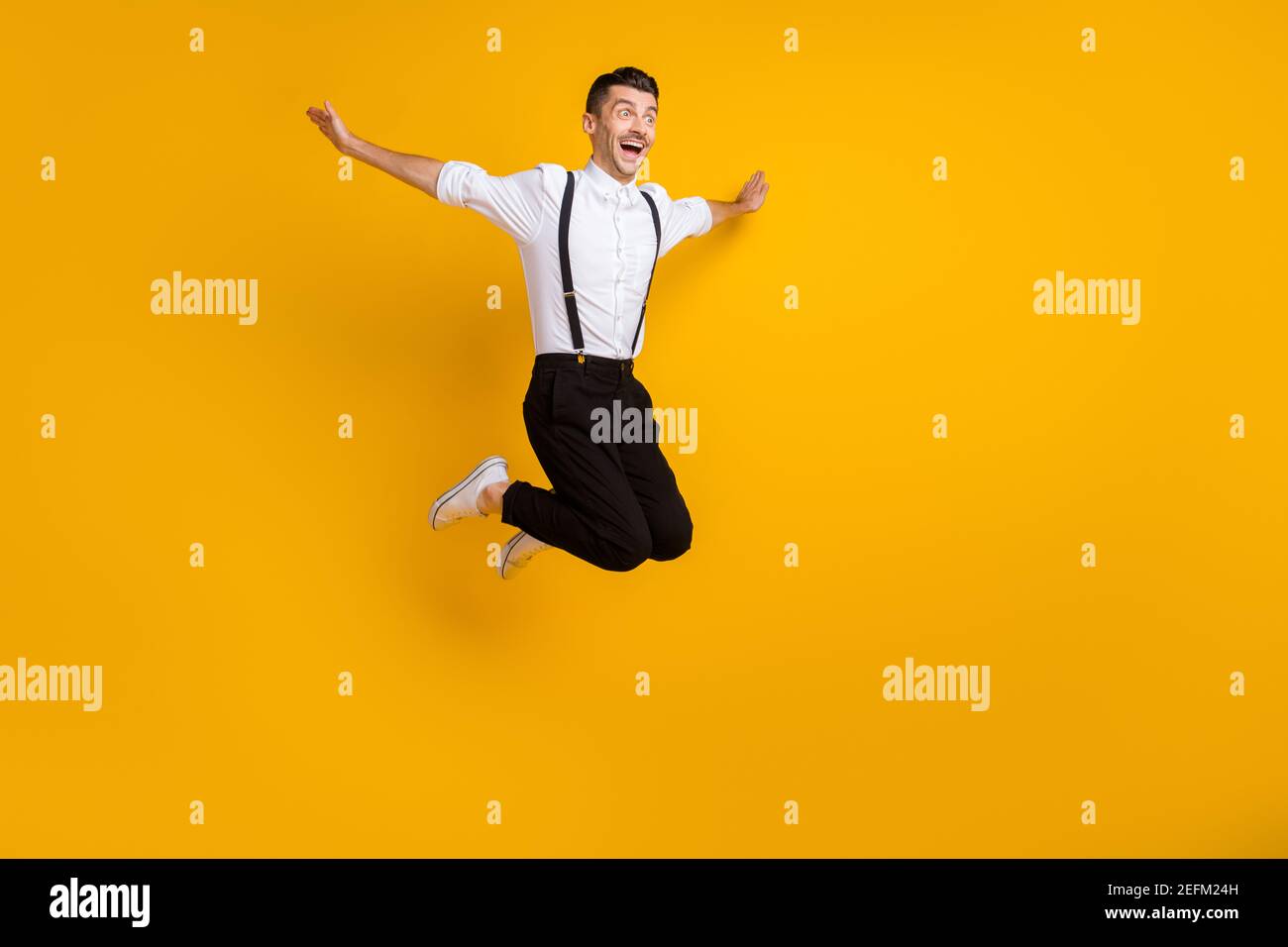 Full length body size photo jumping dreamy man playful imagine flying ...