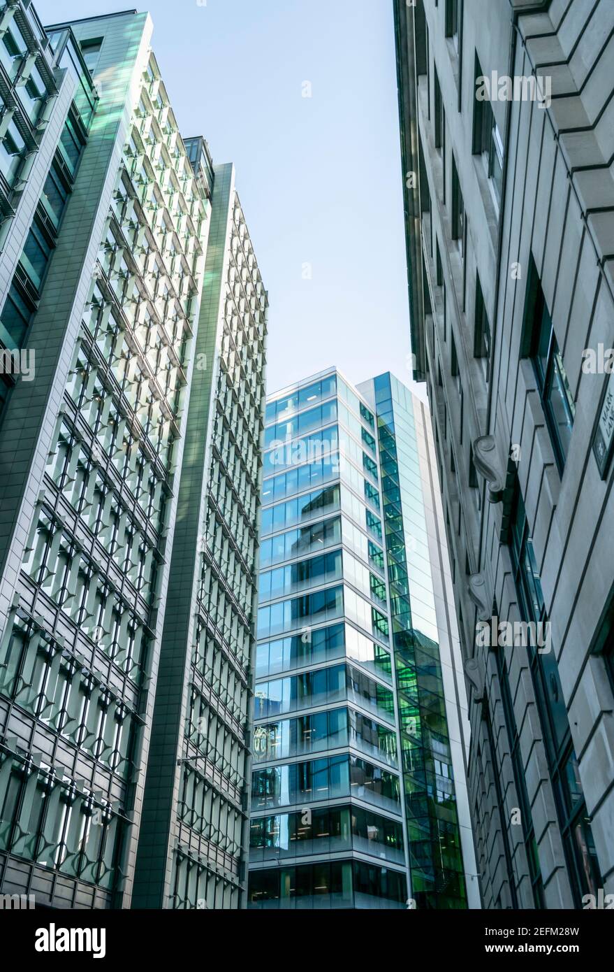 View for variety of tall glass commercial buildings close together ...