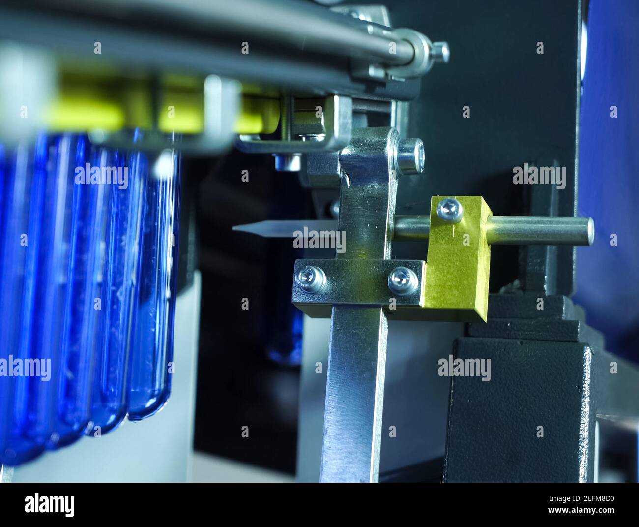 Filling line in plastic flasks. Liquid Filling Plant Stock Photo - Alamy