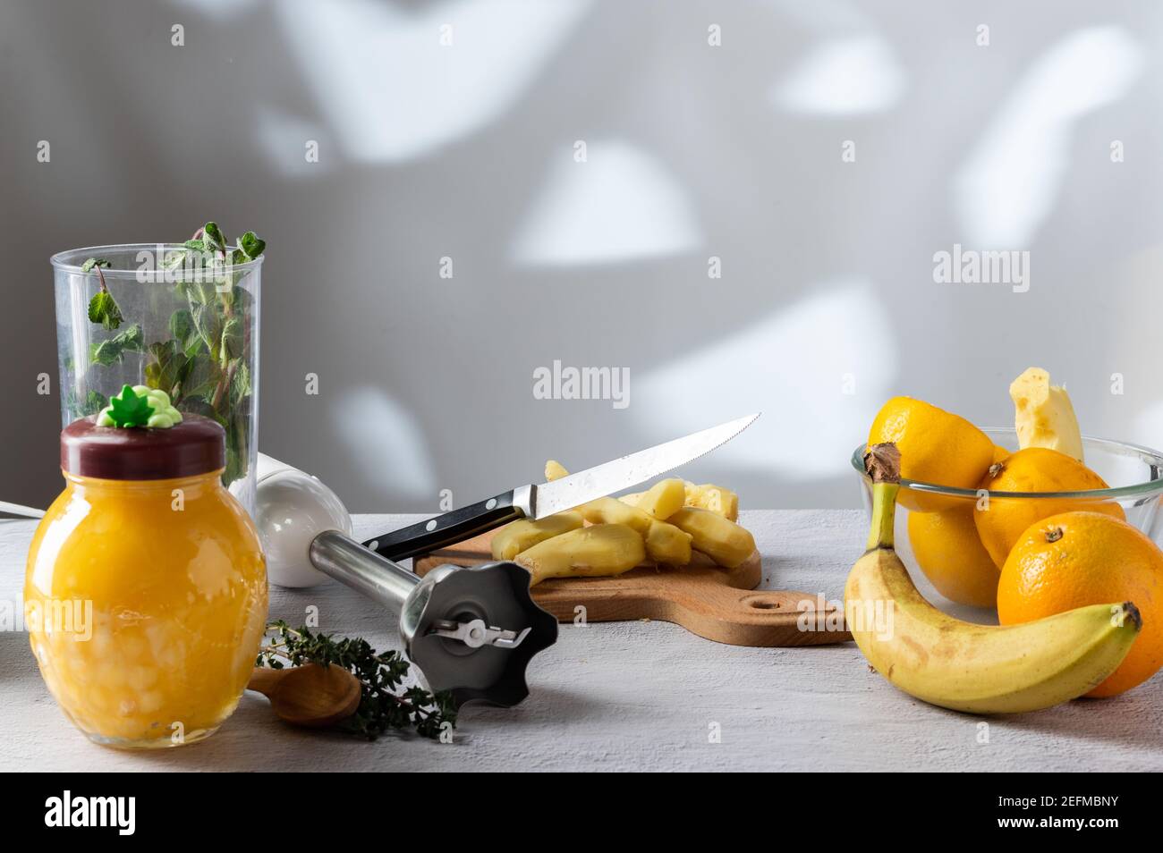 Sharp kitchen knife on peeled foods. Kitchen knife on the table with ...