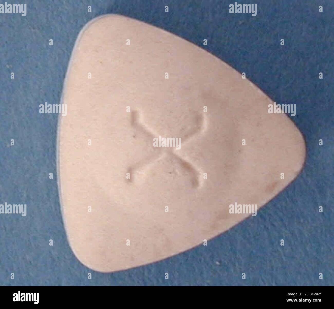 Off white triangular tablet marked Stock Photo - Alamy