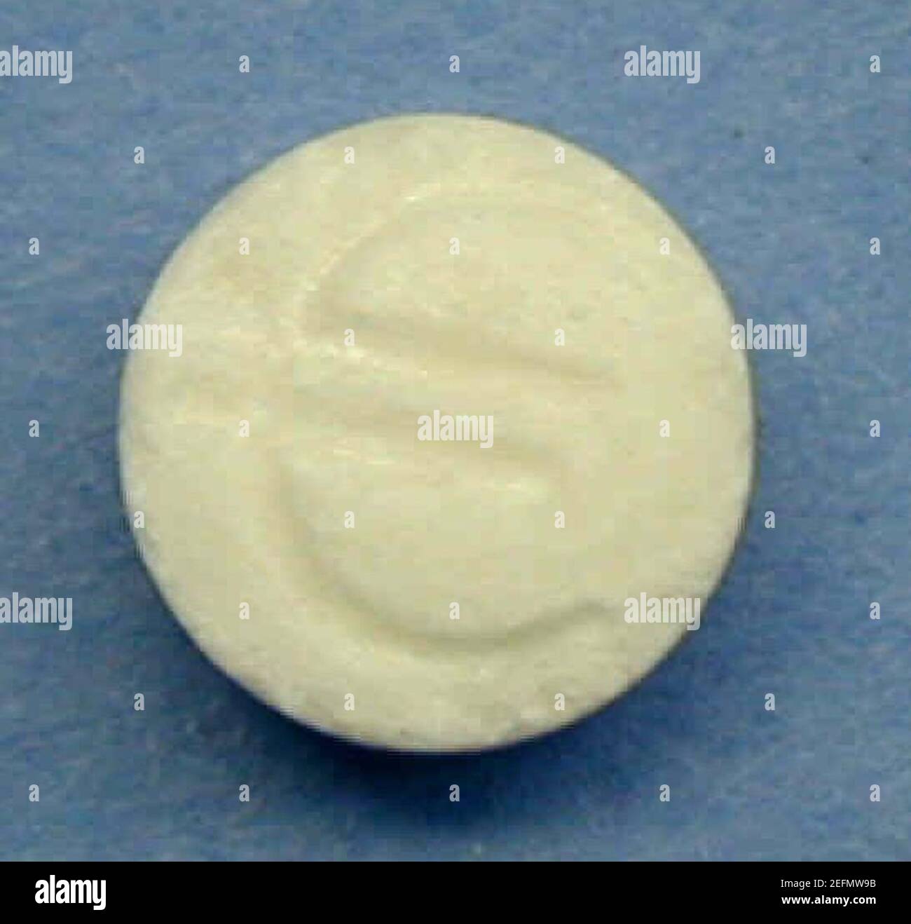 Off white tab marked e mdma hcl cropp Stock Photo - Alamy