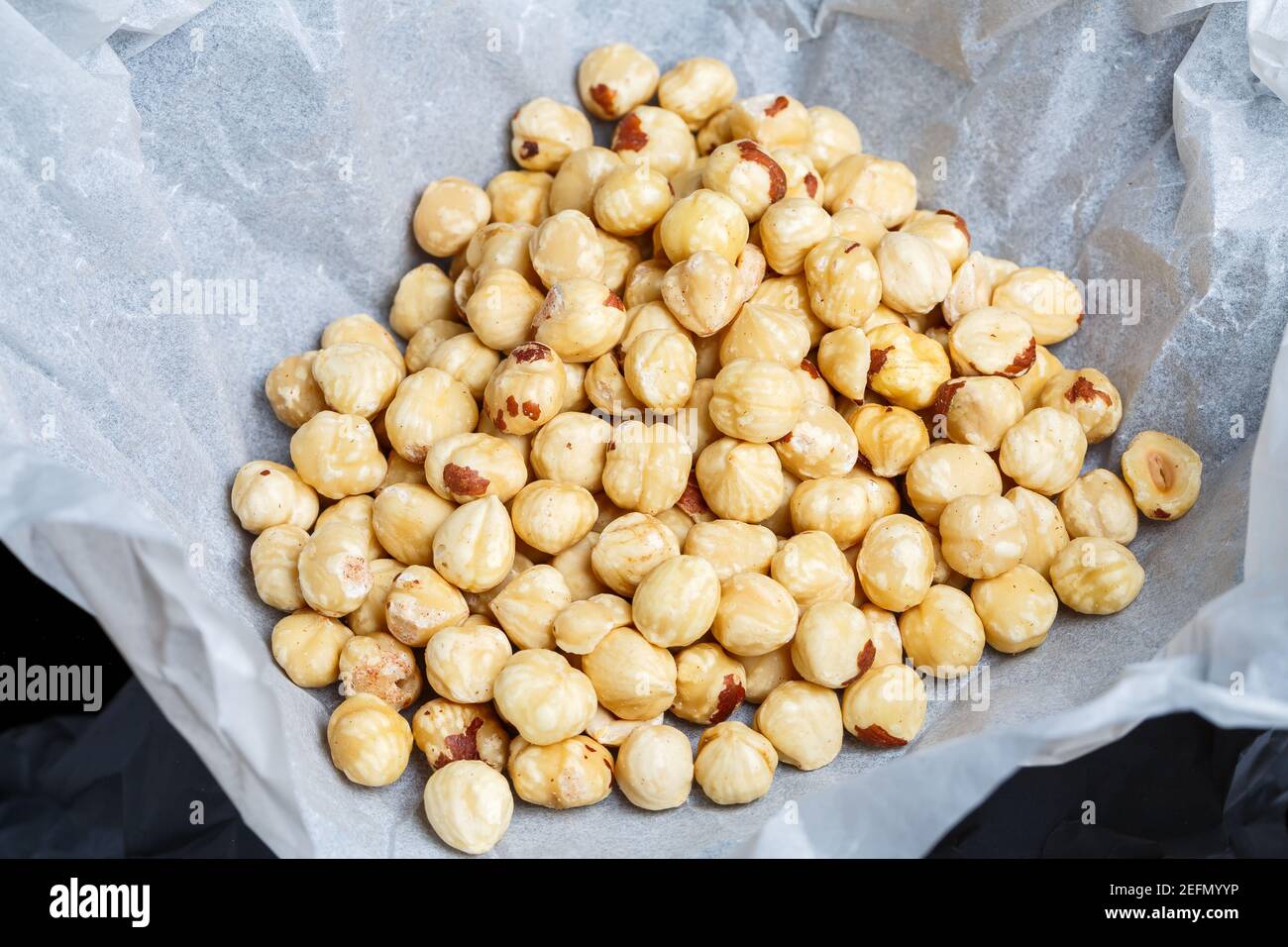 Delicious fried crispy hazelnuts lies in a heap, nuts close-up Stock ...