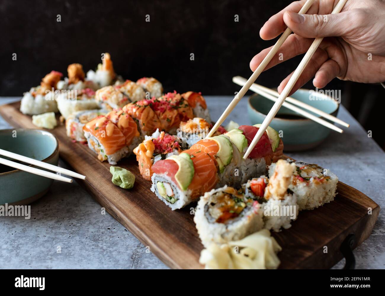 Picking up with chopsticks hi-res stock photography and images - Alamy