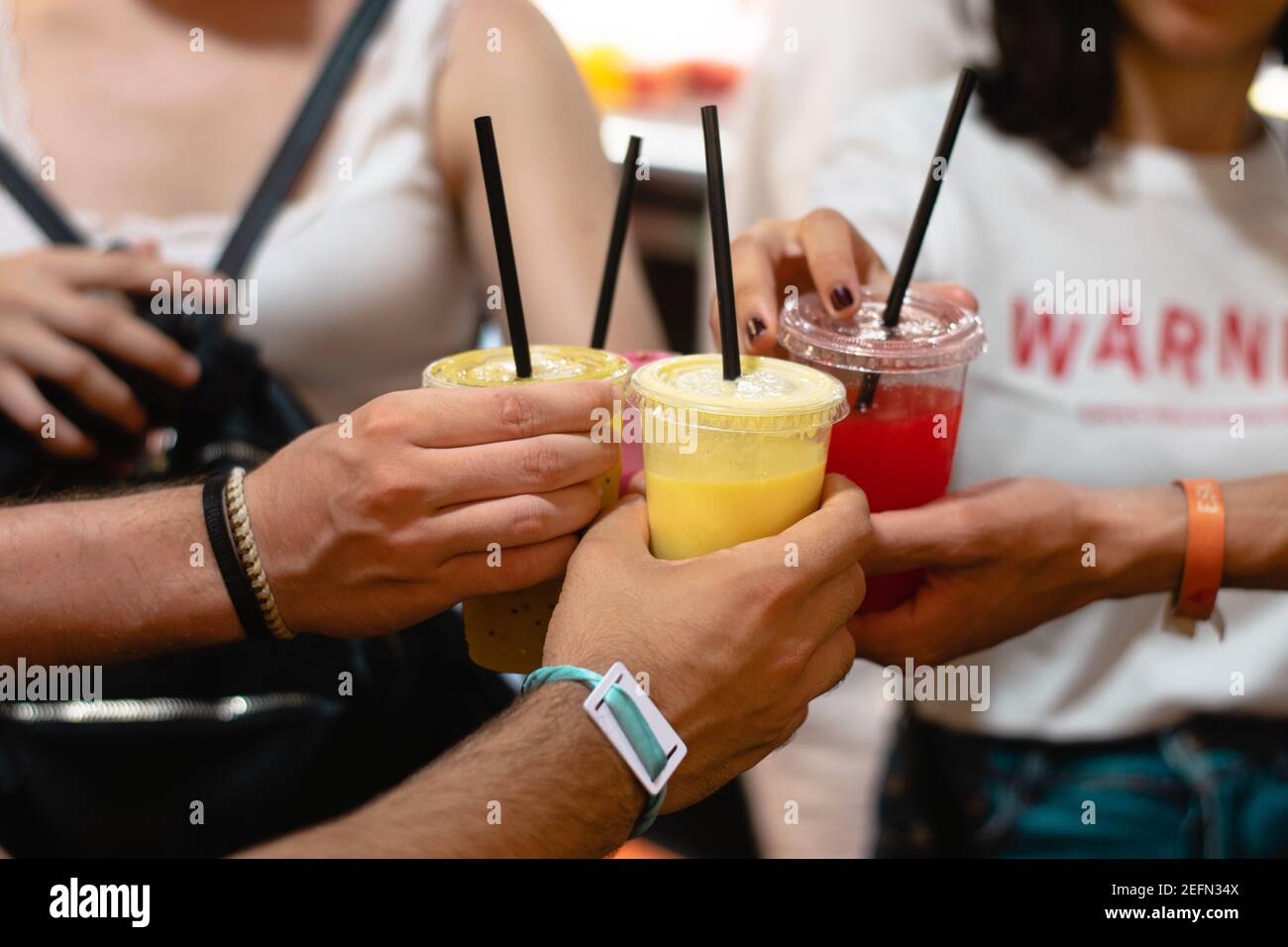 A group of friends with differents color shakes Stock Photo - Alamy