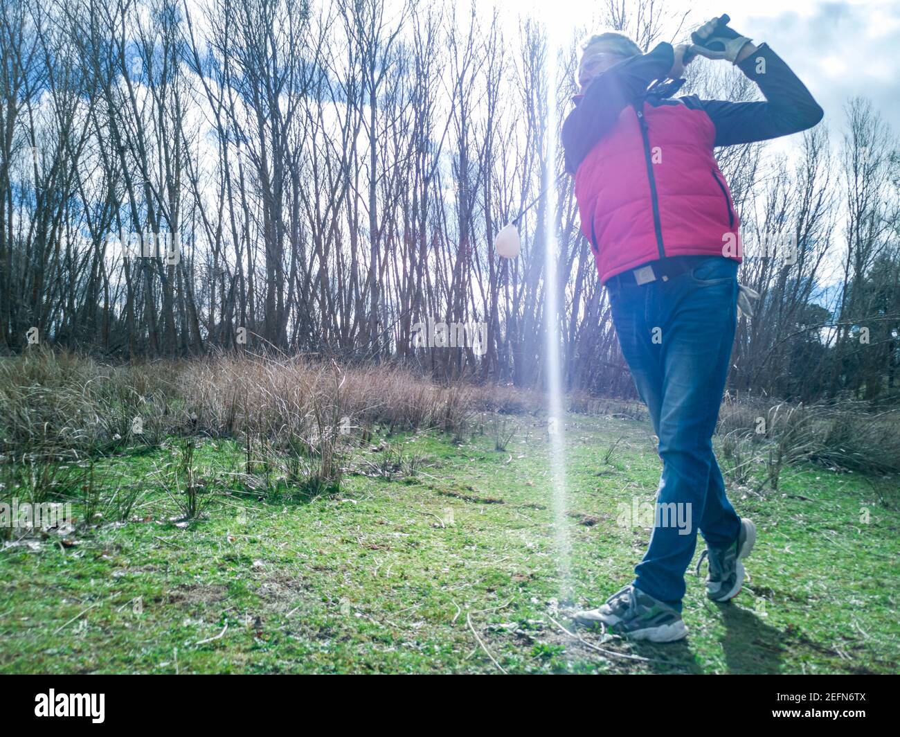 Man on golf range hi-res stock photography and images - Alamy