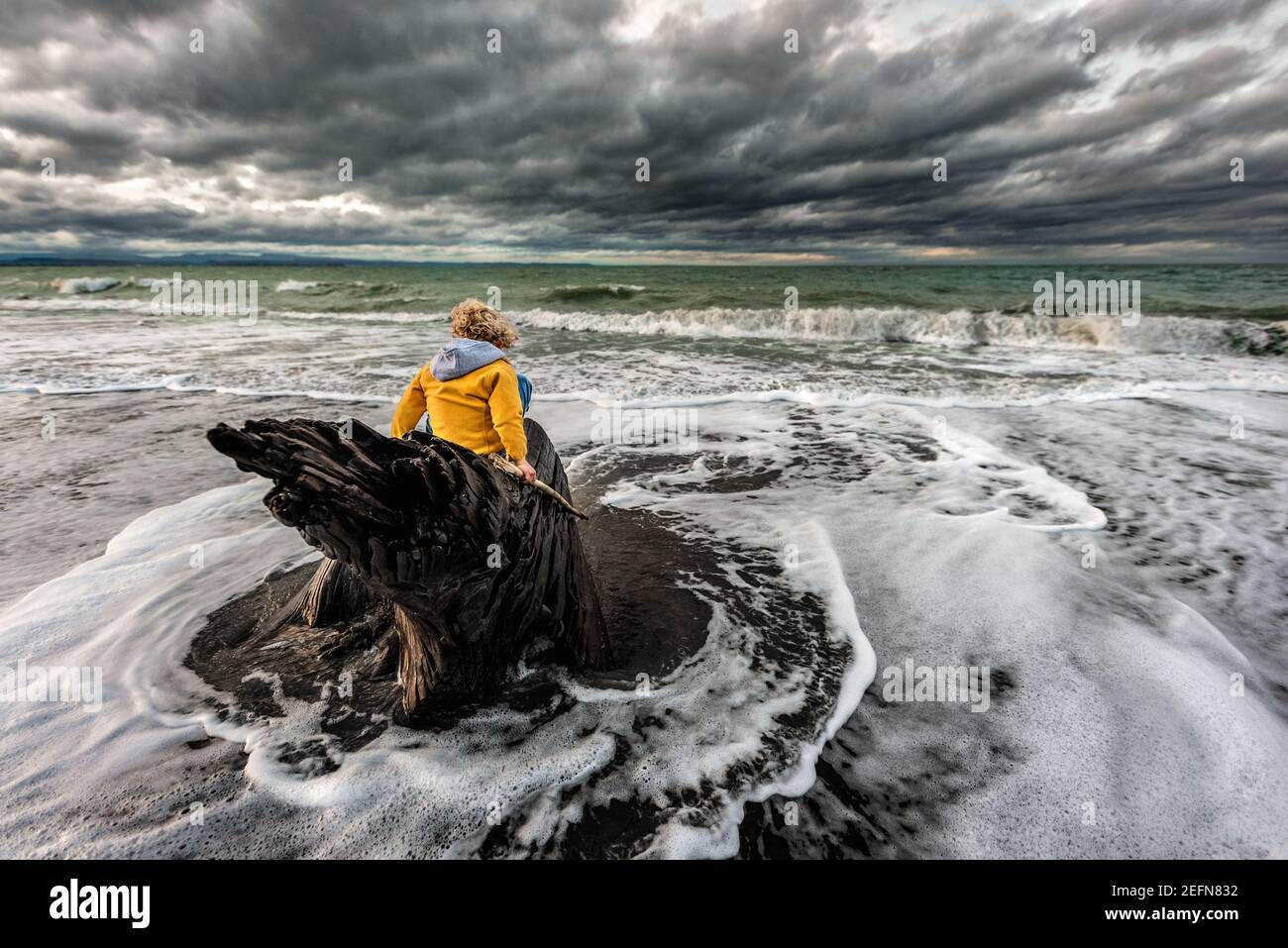 Boy kid climb sea hi-res stock photography and images - Alamy