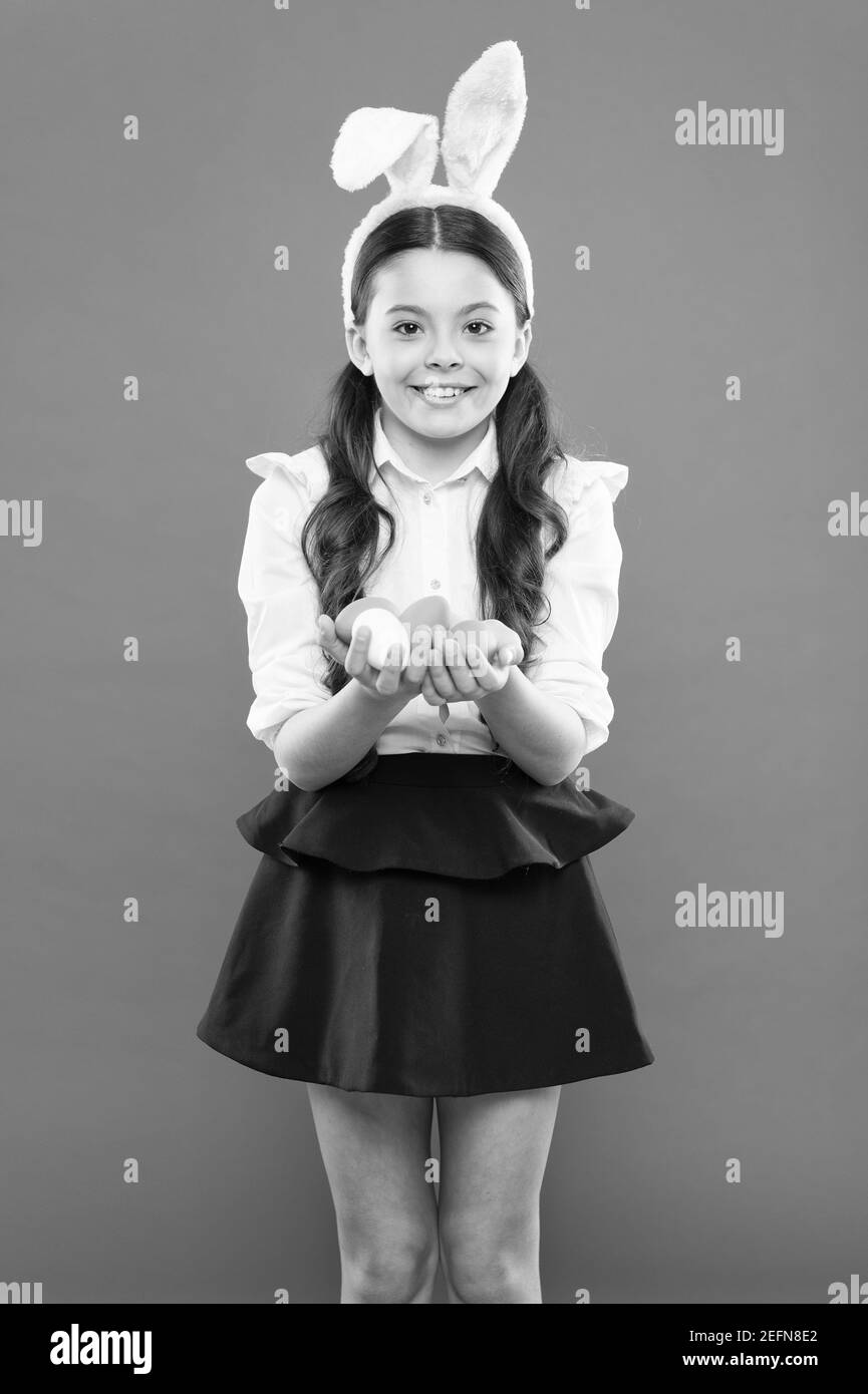 Little girl easter eggs. Cute bunny schoolgirl celebrate Easter day ...