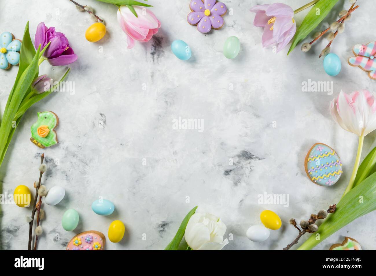 Easter concept - cookies with flowers on marble background Stock Photo ...