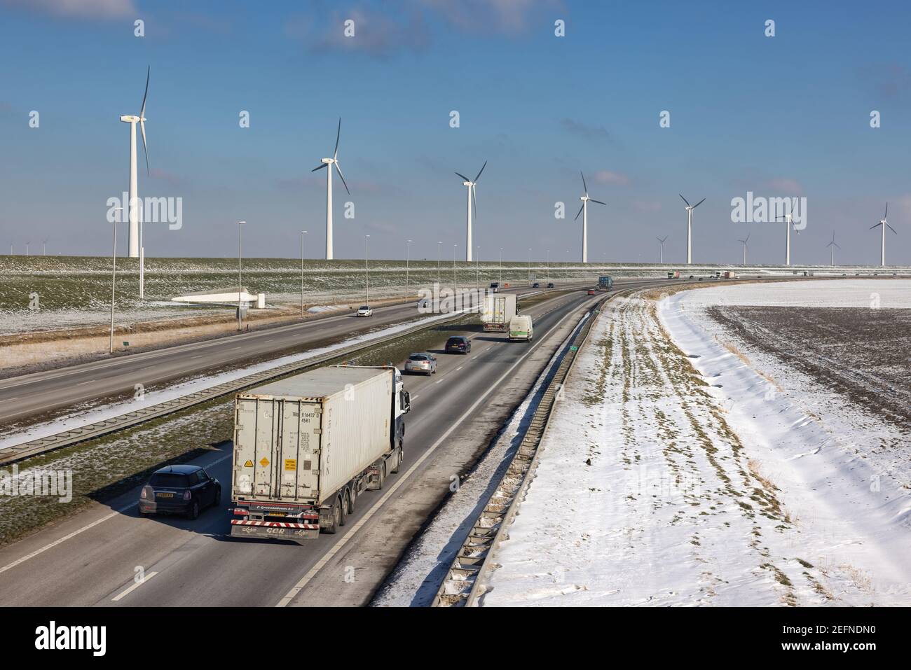 Winter view at Dutch Highway with trucks near Lelystad Stock Photo - Alamy