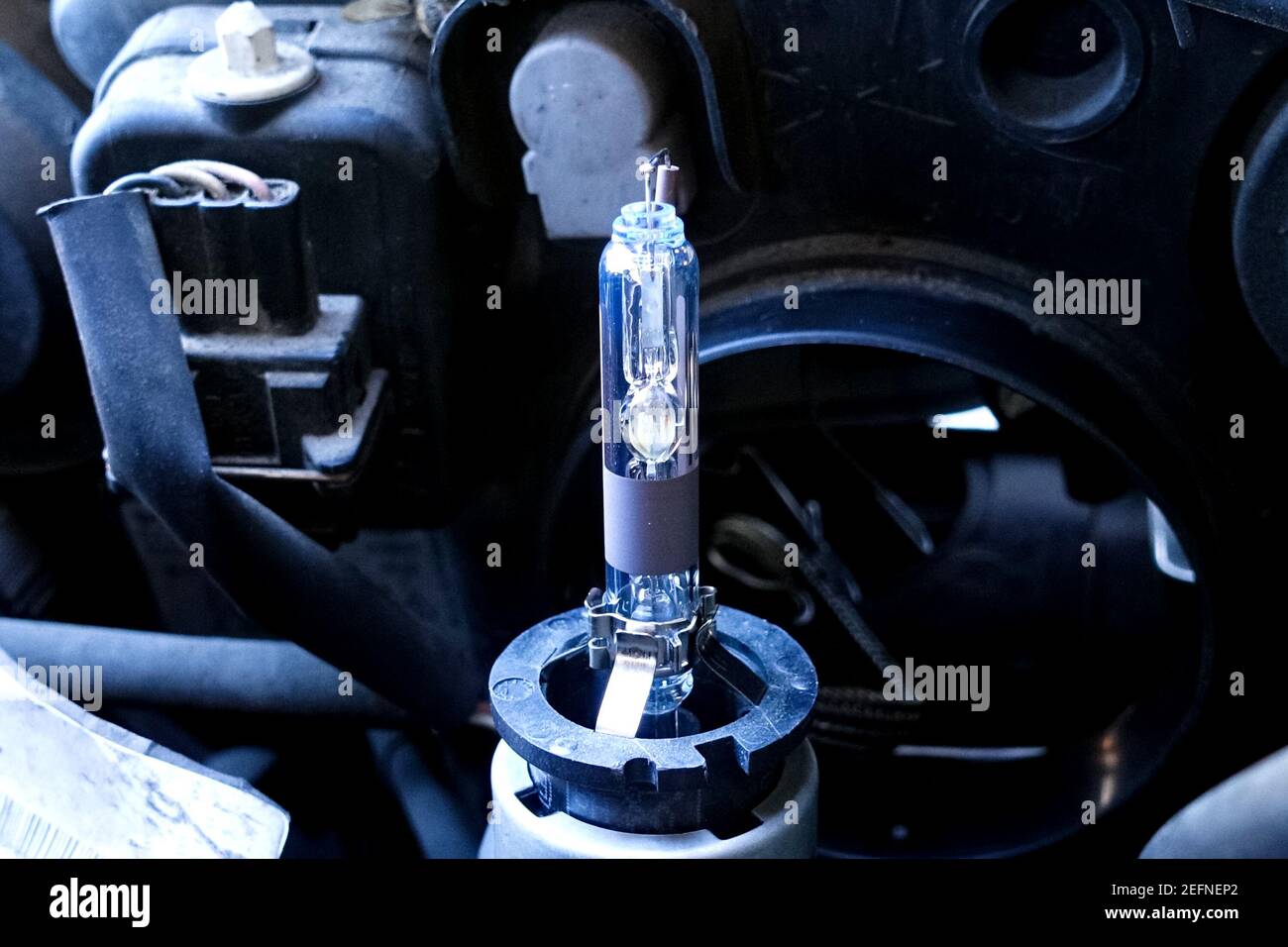 Installation of a new headlight lamp hi-res stock photography and ...