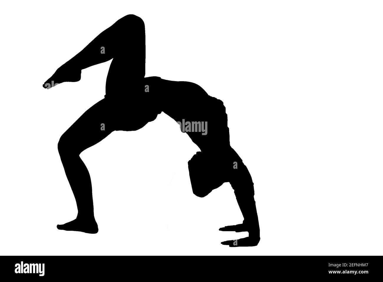 Silhouette of a woman in an acrobatic position Stock Photo - Alamy