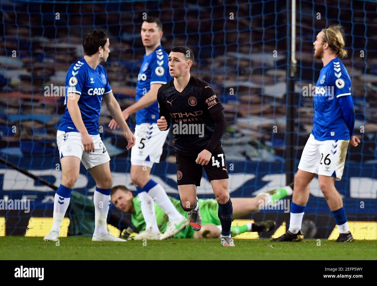 Manchester City's Phil Foden celebrates scoring the opening goal during ...