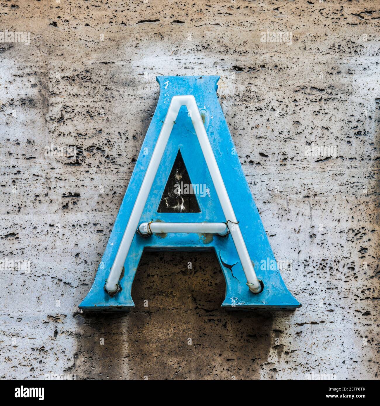 Old neon letter A in turquoise colour Stock Photo - Alamy