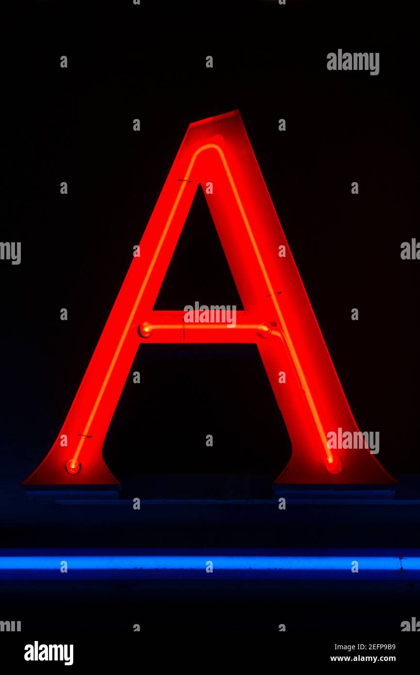 Shining red neon letter A Stock Photo - Alamy