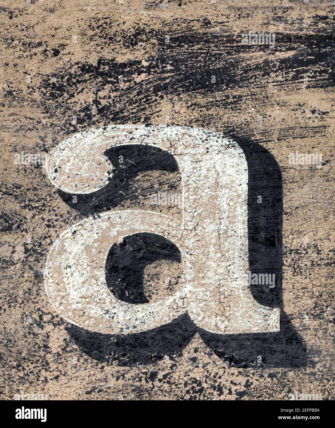 Dissolving letter a of a historical advertising font Stock Photo - Alamy