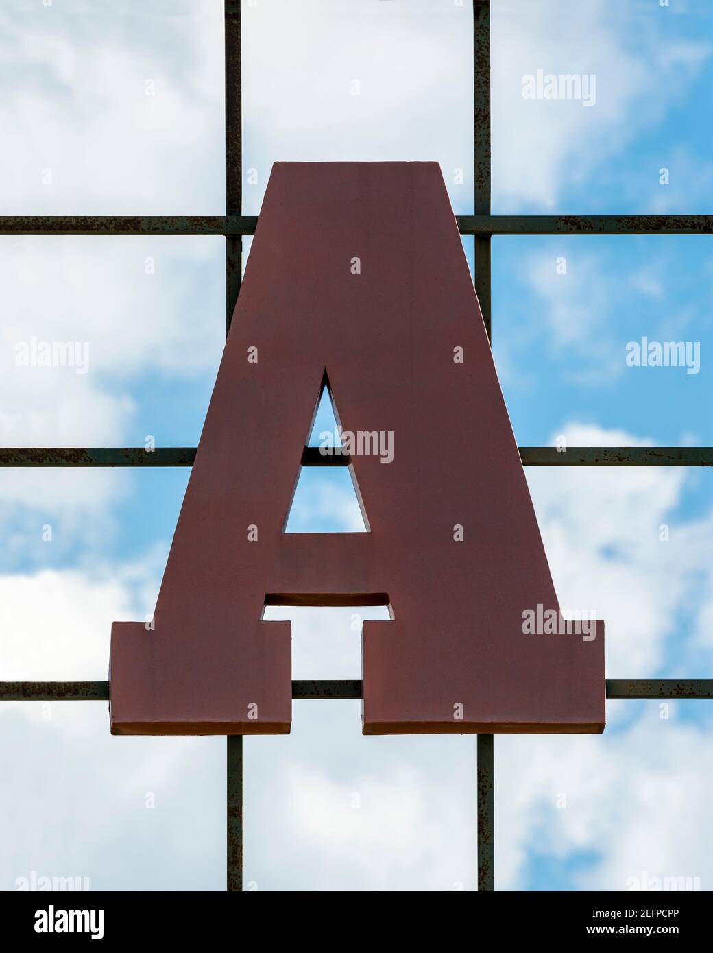 Letter A mounted on metal struts against a white-blue sky Stock Photo ...