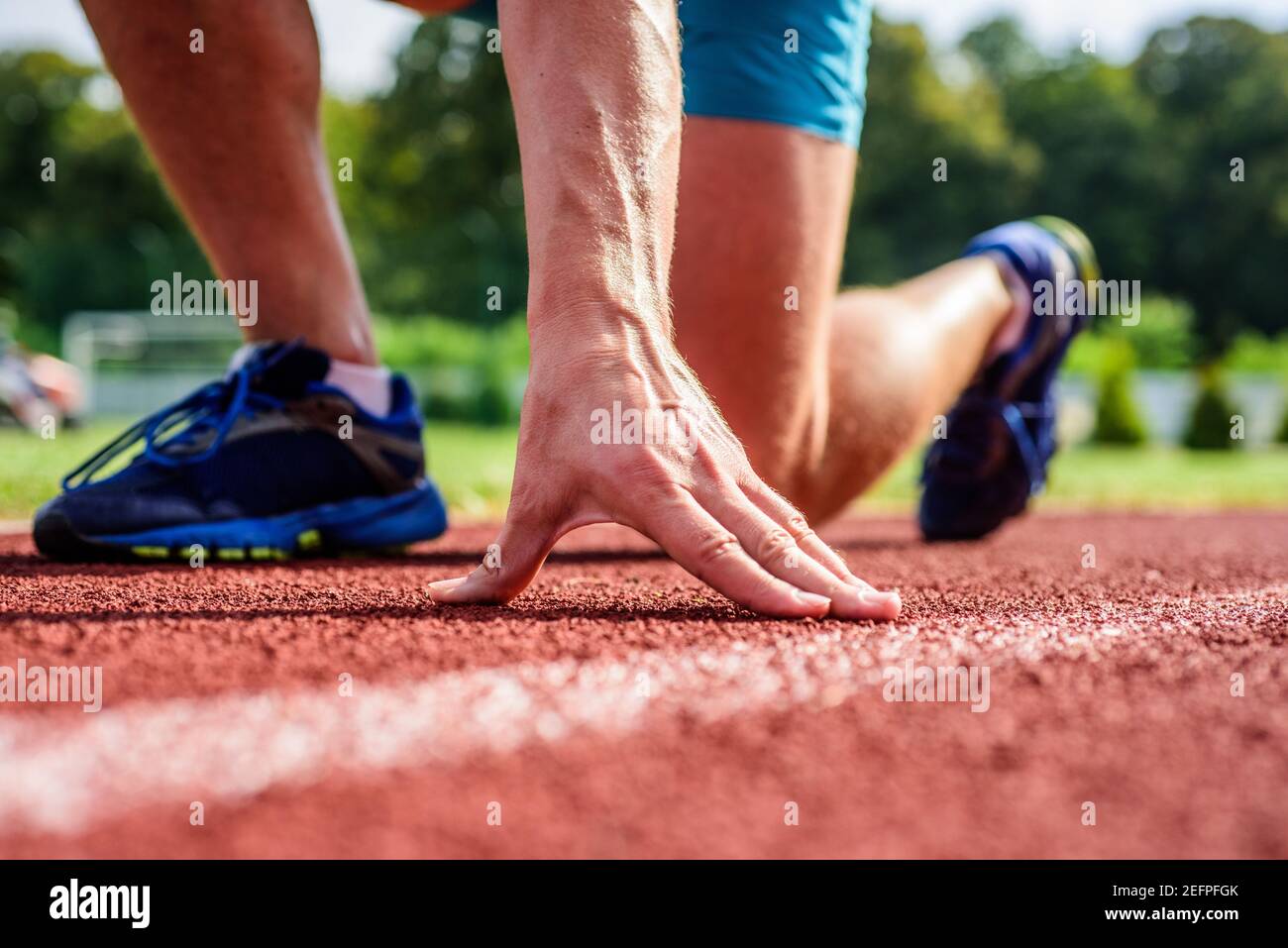 Runner ready to go close up. Ready steady go concept. At beginning of ...