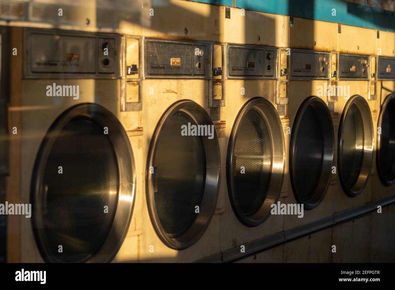 Laundry with many old washing machines Stock Photo - Alamy