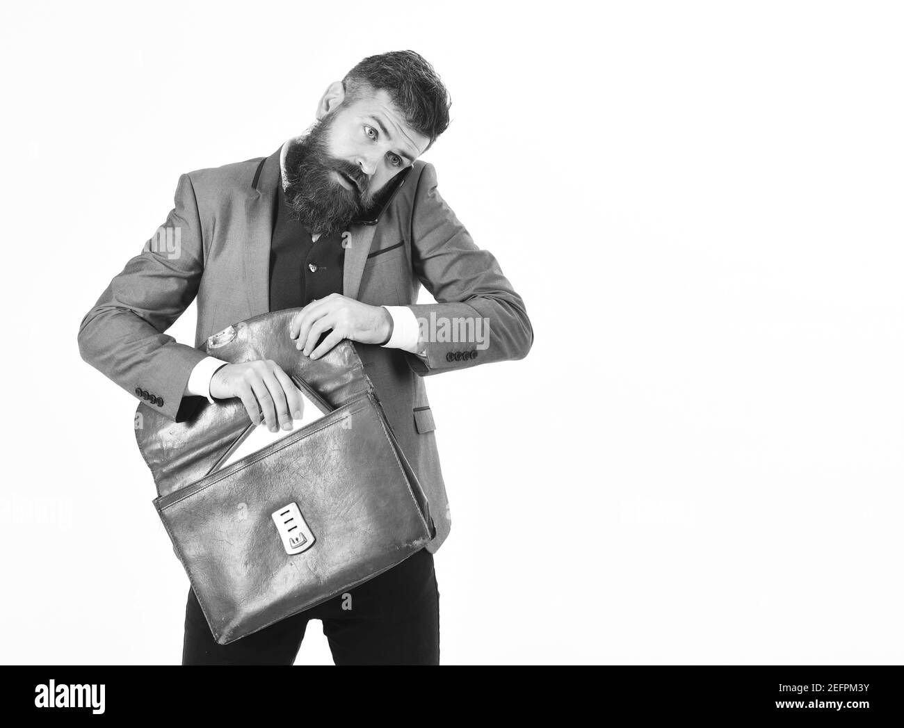 Businessman opens briefcase talking hi-res stock photography and images ...