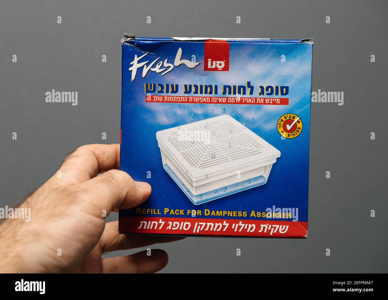 Paris, France - May 3, 2020: POV male hand holding package with ...