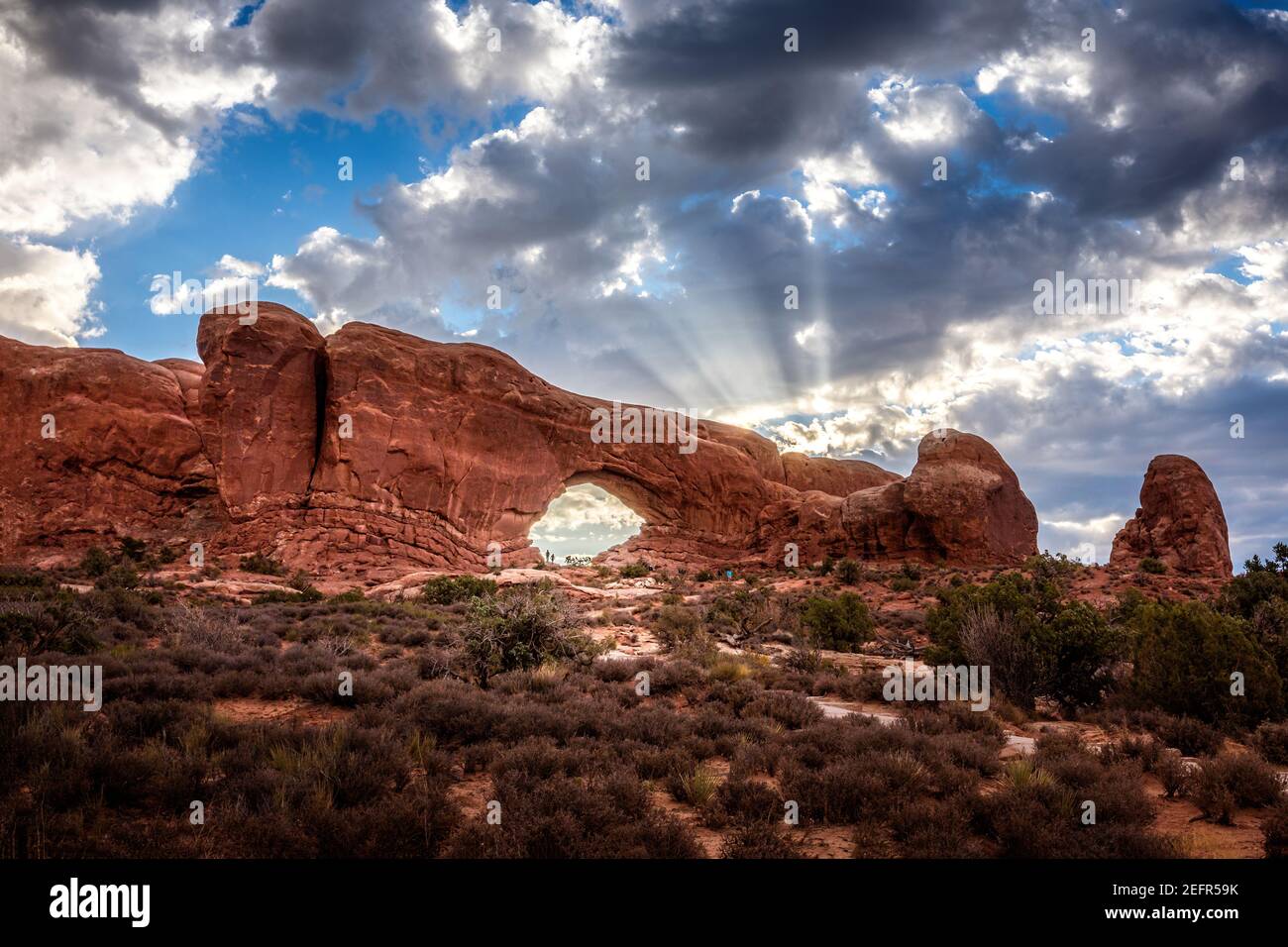 The window section, South window arch with the first sunrays of the day ...