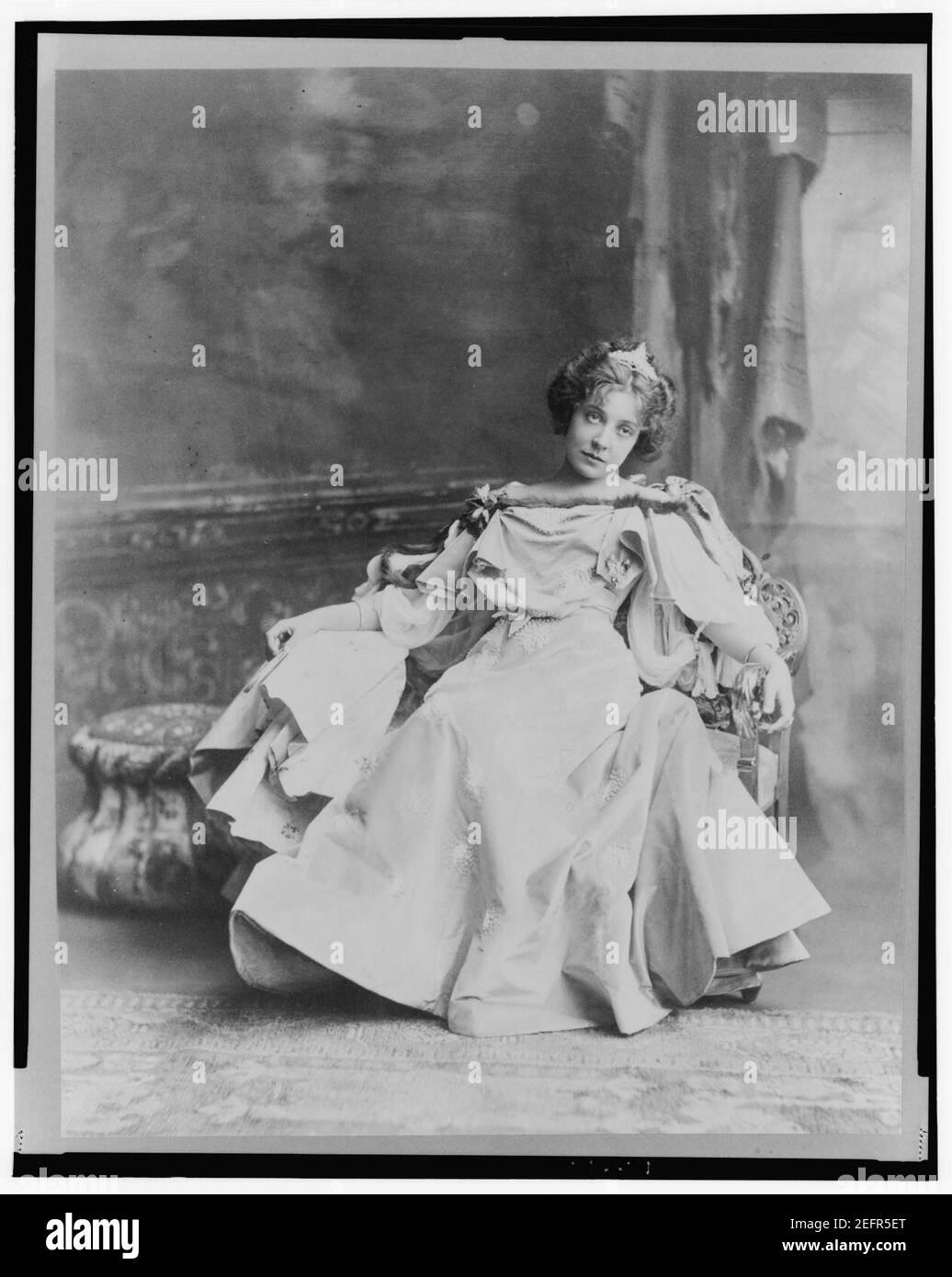 Olga Nethersole, full-length portrait, reclining in chair, facing front ...