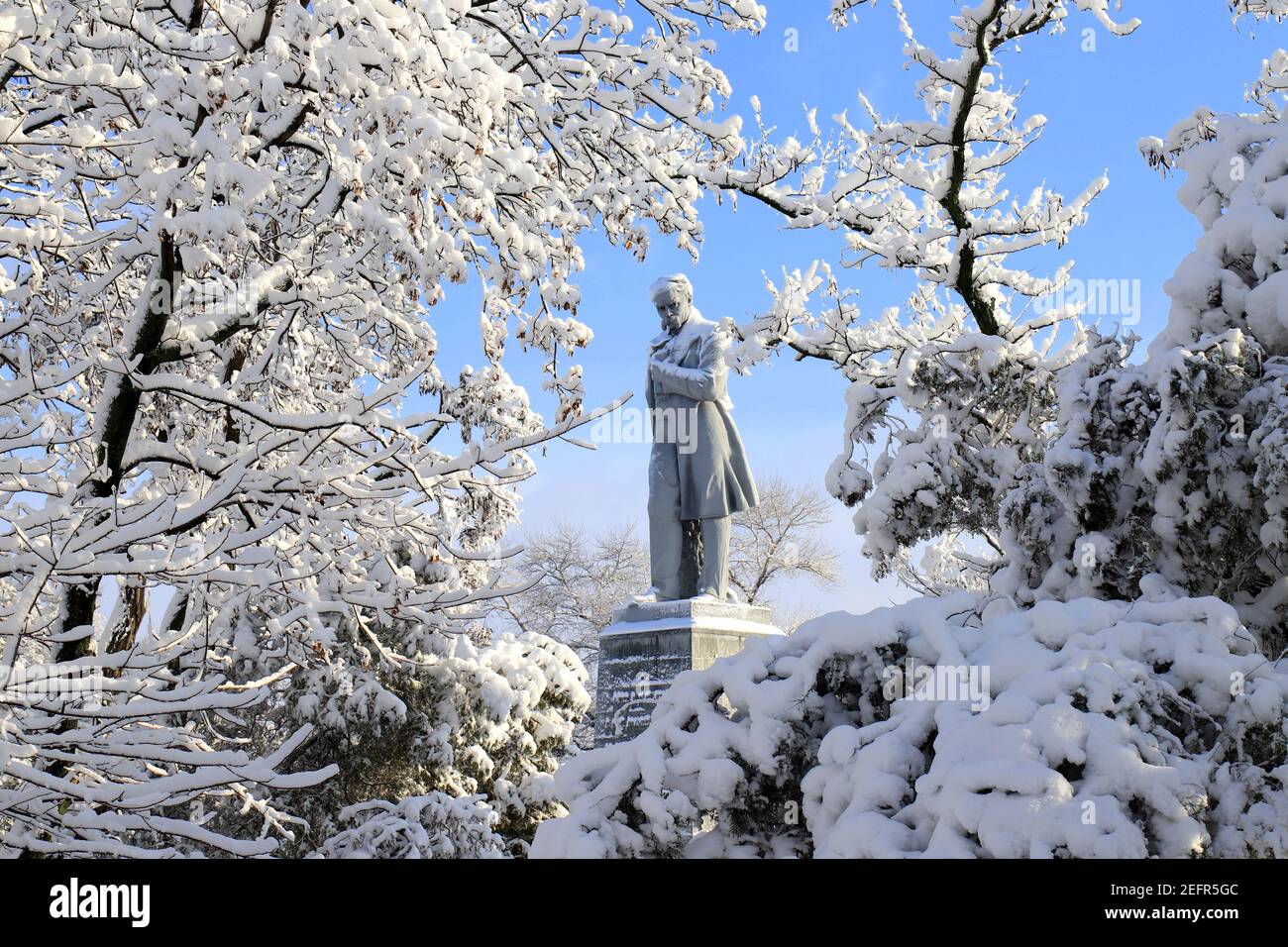 Winter in Ukraine. A large monument to famous Ukrainian poet Shevchenko ...