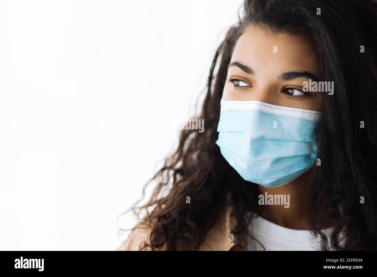 Prevention measures. African american pretty brunette woman in casual ...