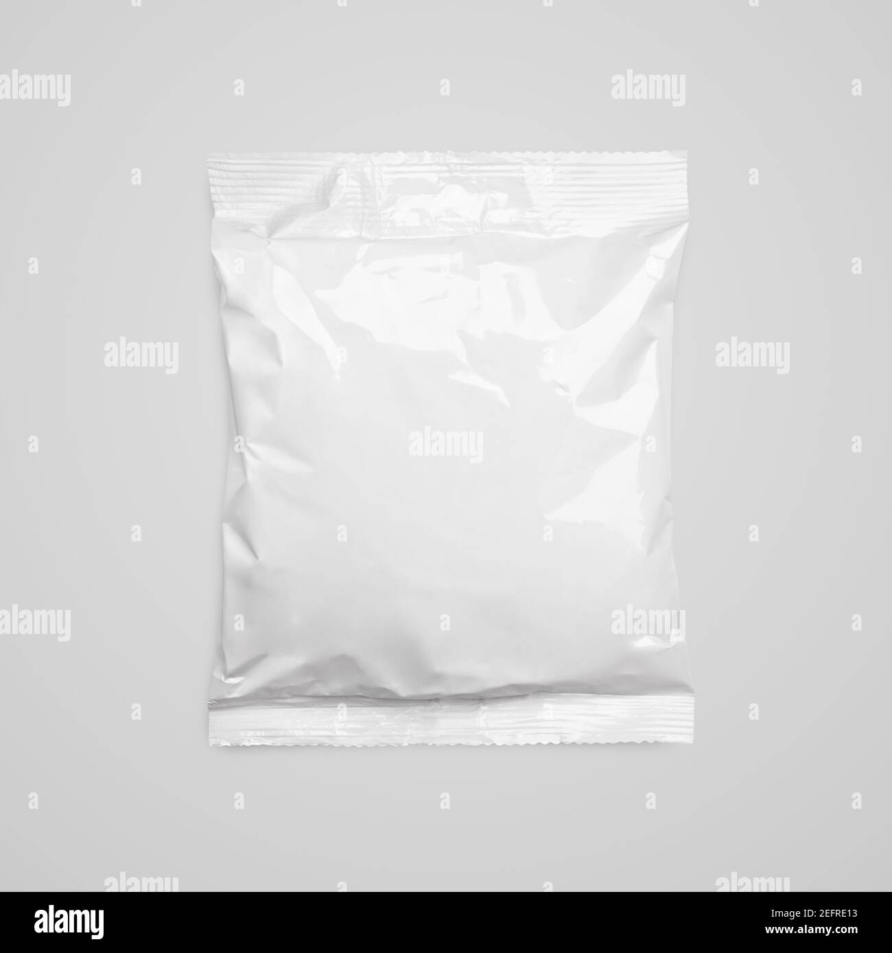 Top view of blank plastic pouch food packaging on gray with clipping ...