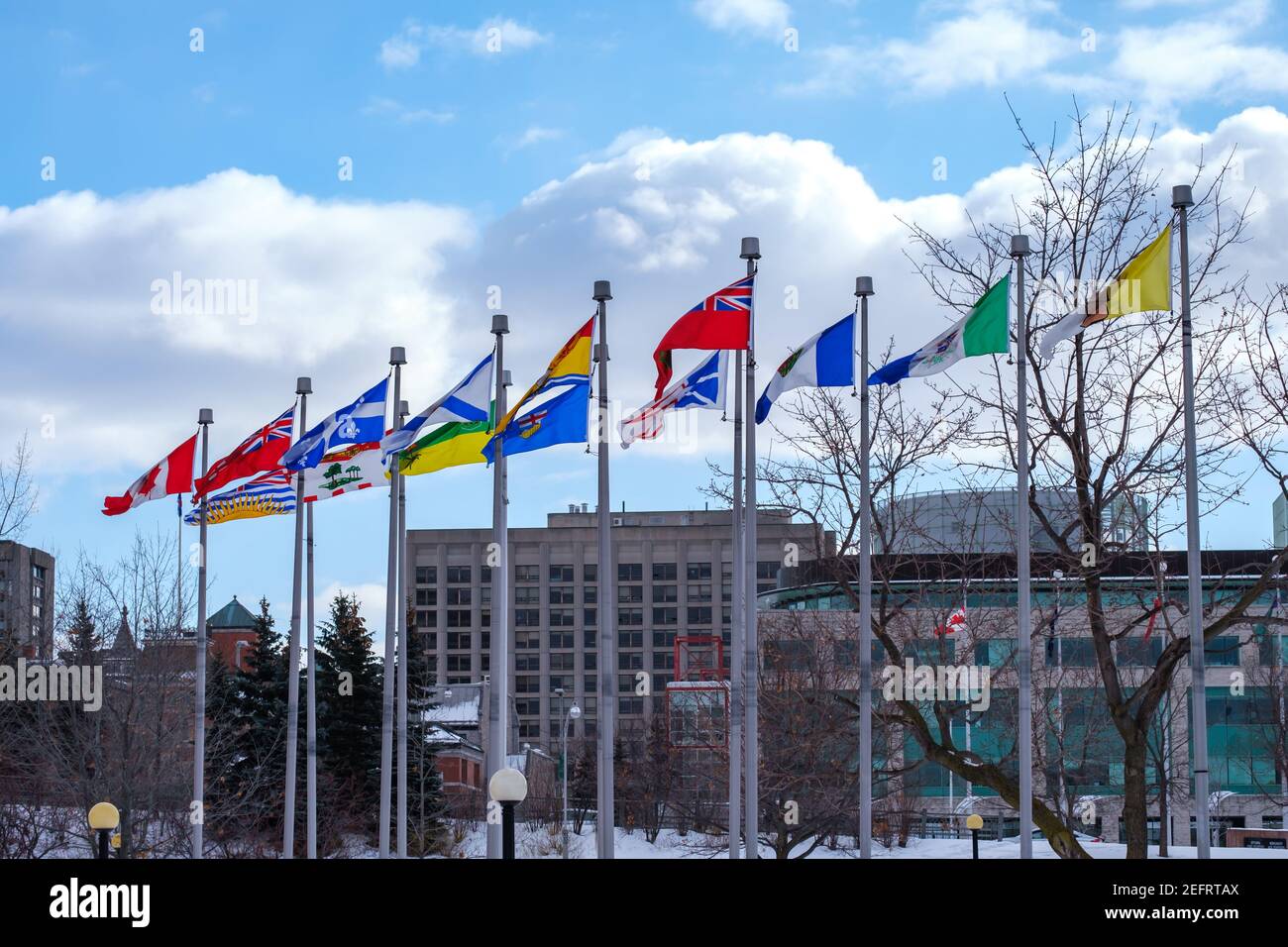 Ottawa, Ontario, Canada - February 6, 2021: The flags of the ten provinces and three territories ...