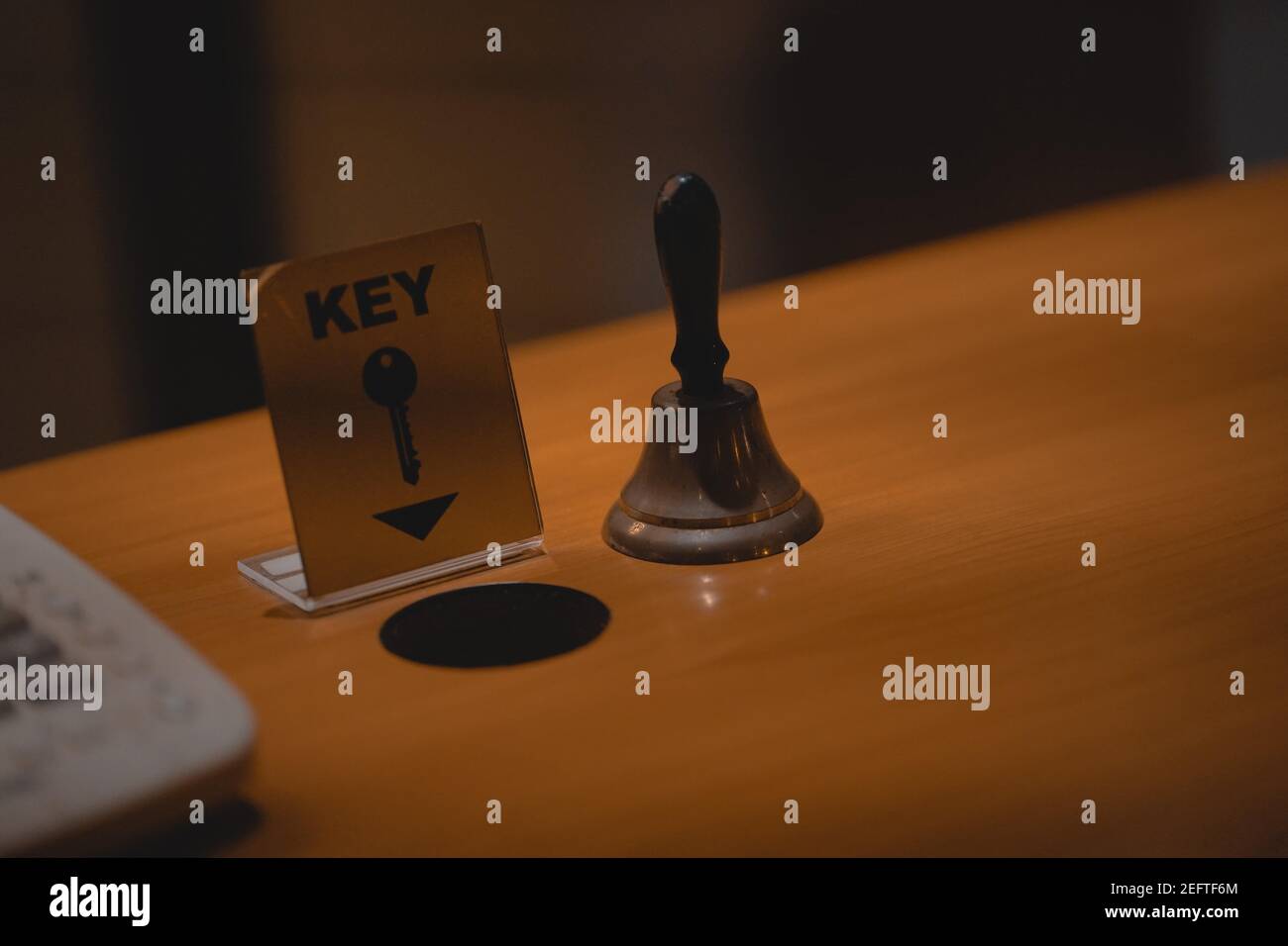 View of a bell and drop key sign on the hotel front desk Stock Photo ...