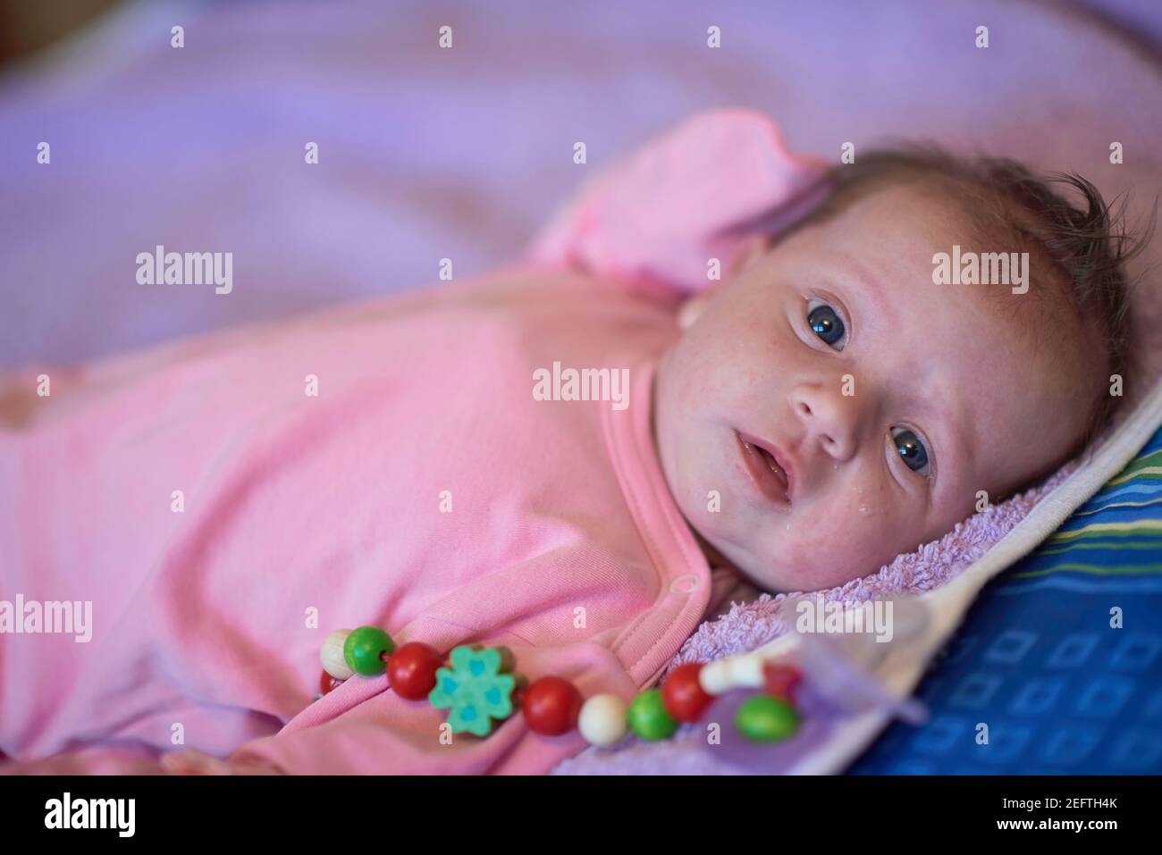 happy newborn little baby smilling Stock Photo - Alamy