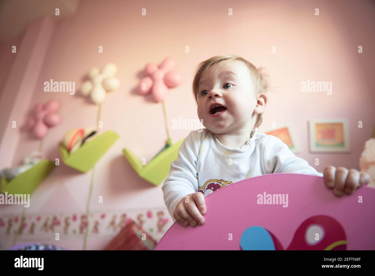 cute little one year old baby and making first steps Stock Photo - Alamy