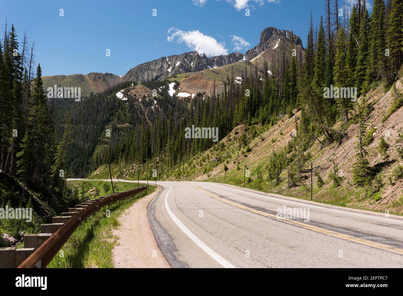 Traveling west of Cameron Pass, along the Cache la Poudre Scenic Byway ...
