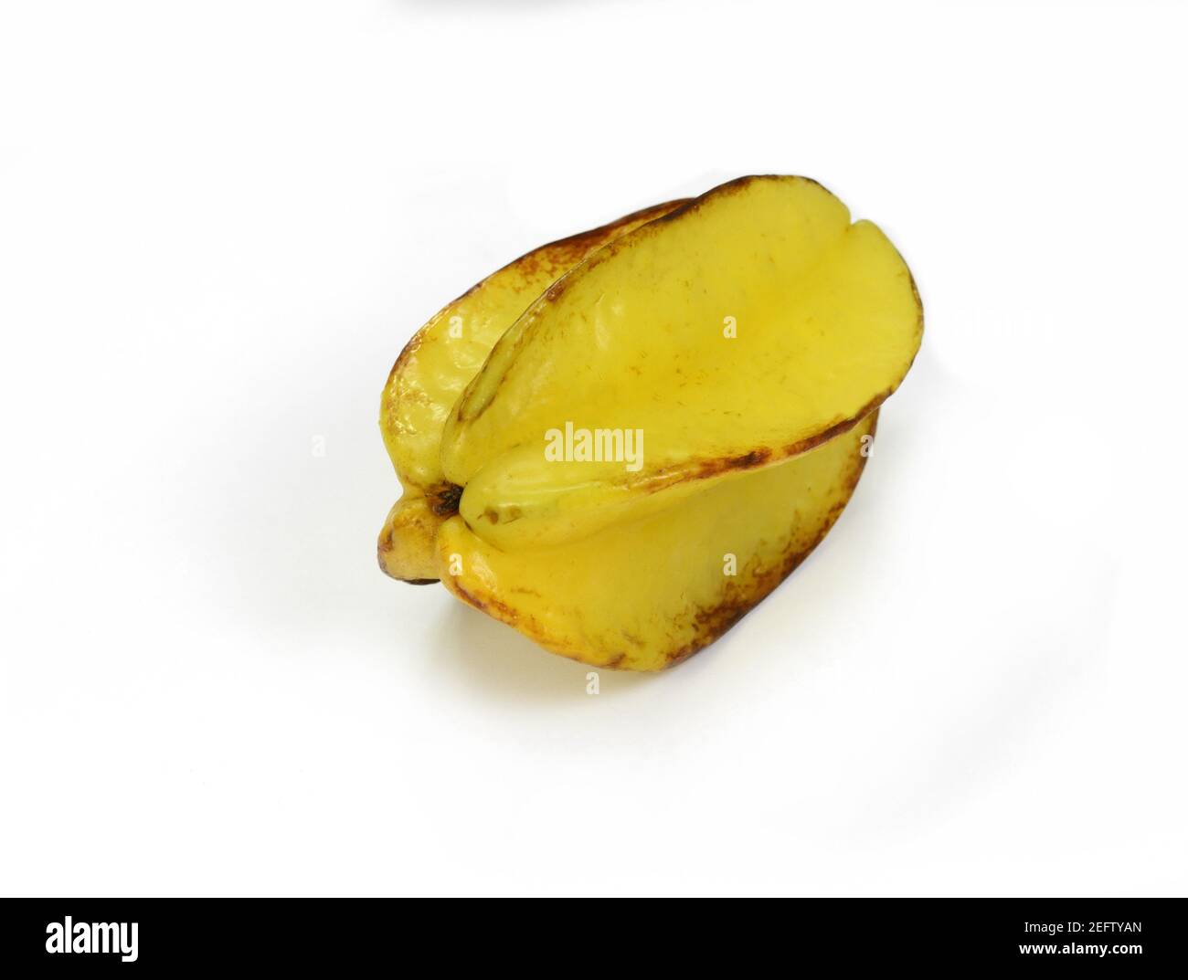Star shaped slices of carambola fruit isolated on white background ...