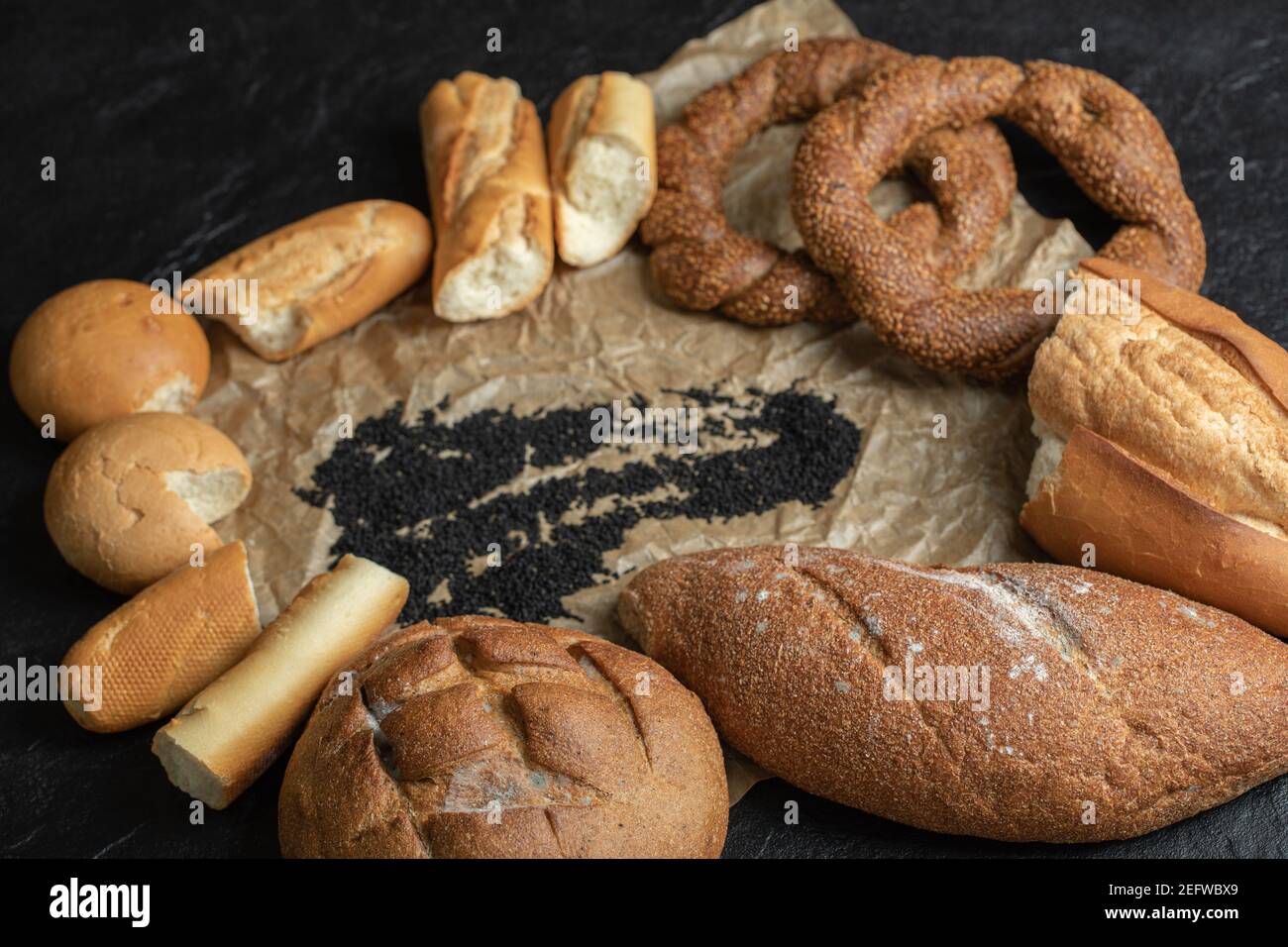 Different types of pastries on a parchment paper Stock Photo - Alamy