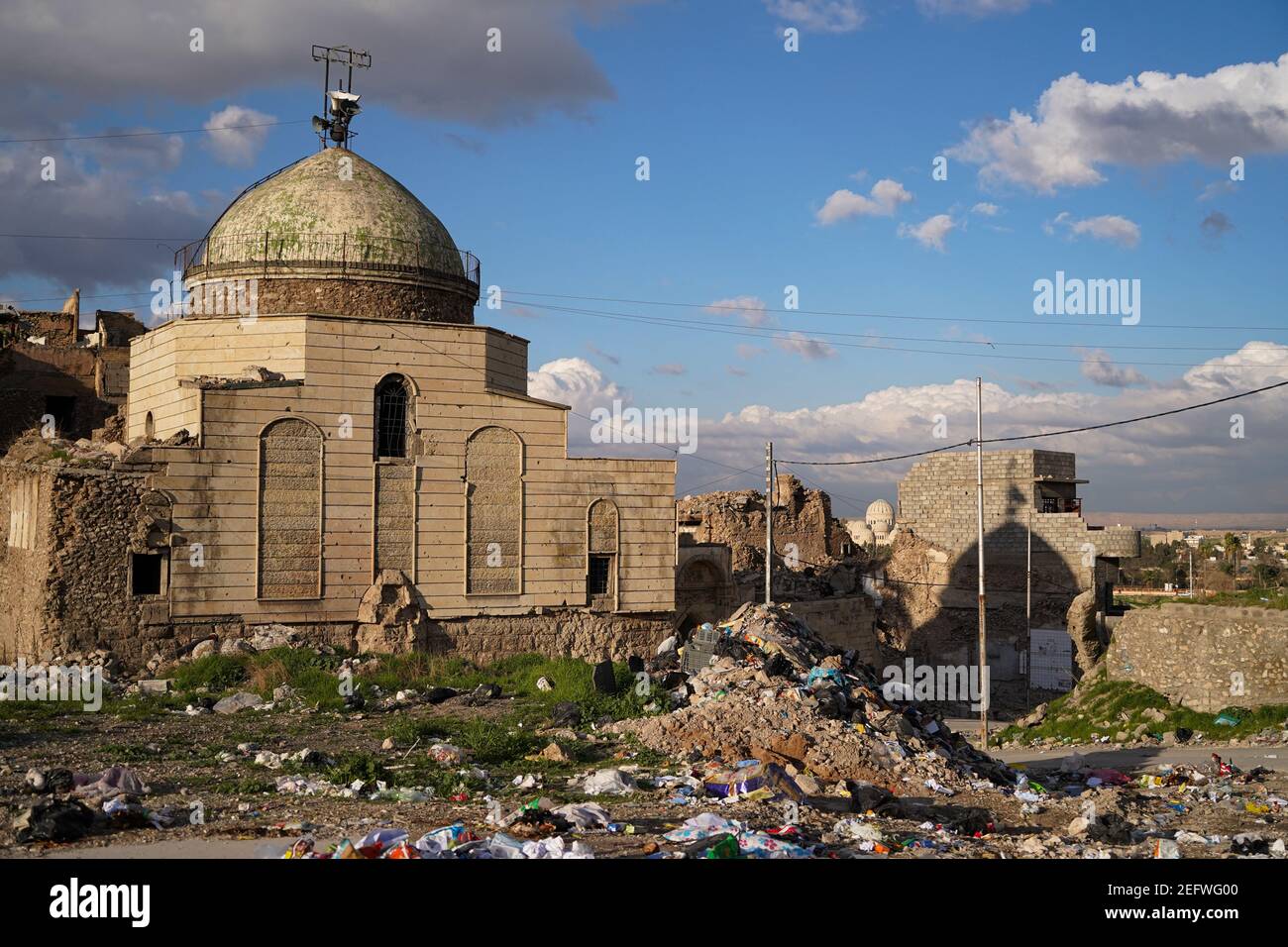 A general view with garbage accumulated in front of the damaged mosque ...