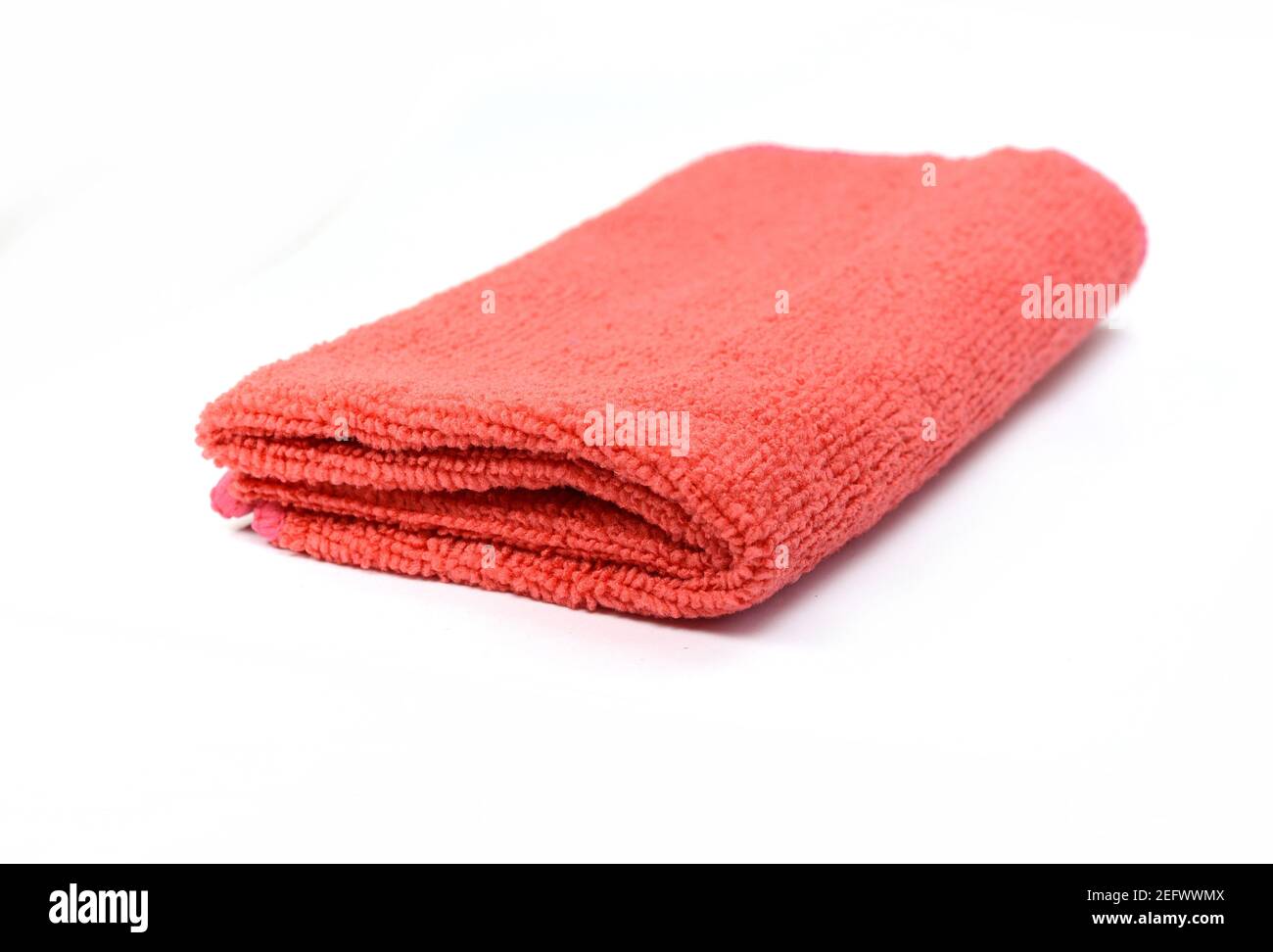 Red micro fiber towel isolated on white background. Clean, new red ...