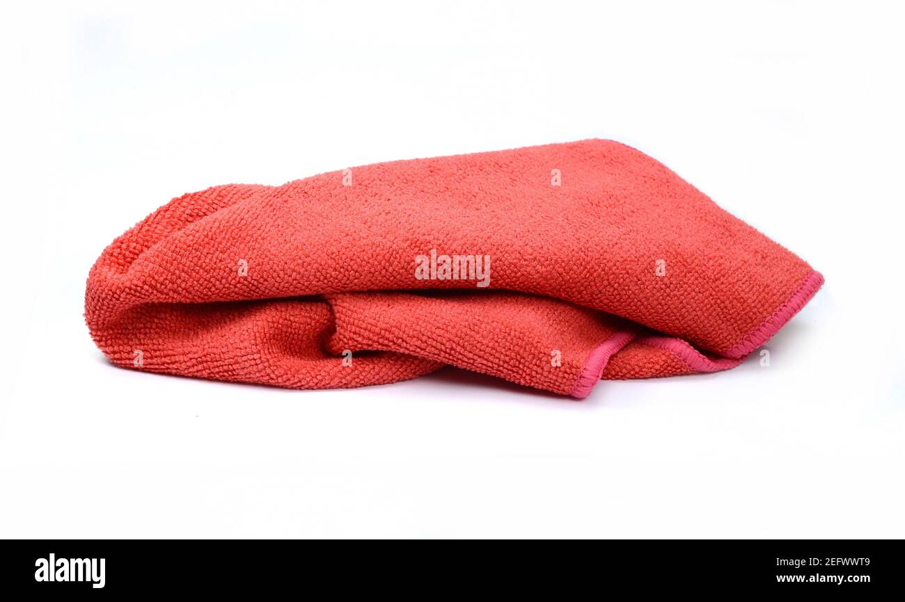 Red micro fiber towel isolated on white background. Clean, new red ...