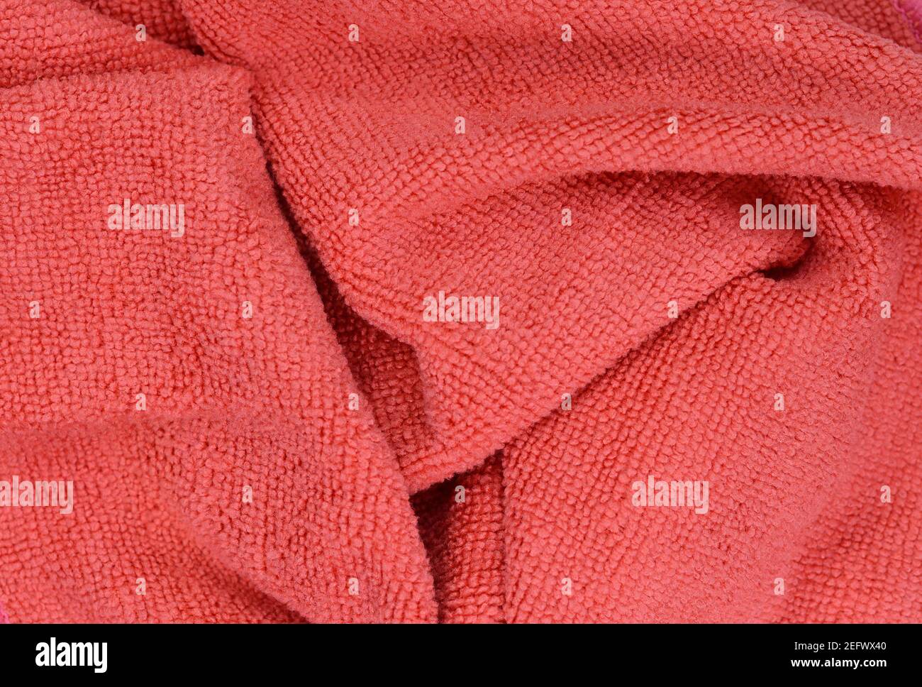 Red micro fiber towel isolated on white background. Clean, new red ...