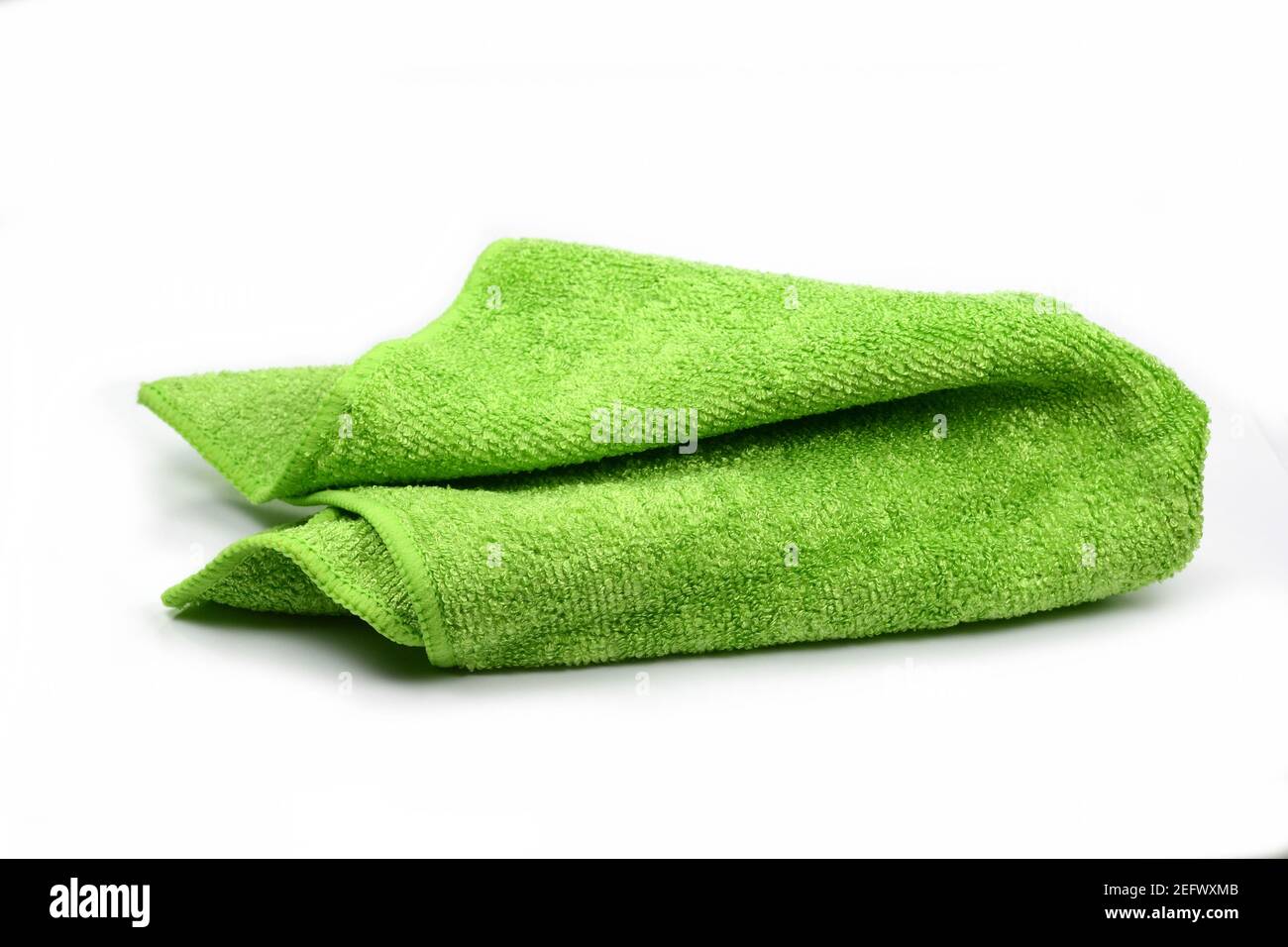 Green micro fiber towel isolated on white background. Clean, new green ...