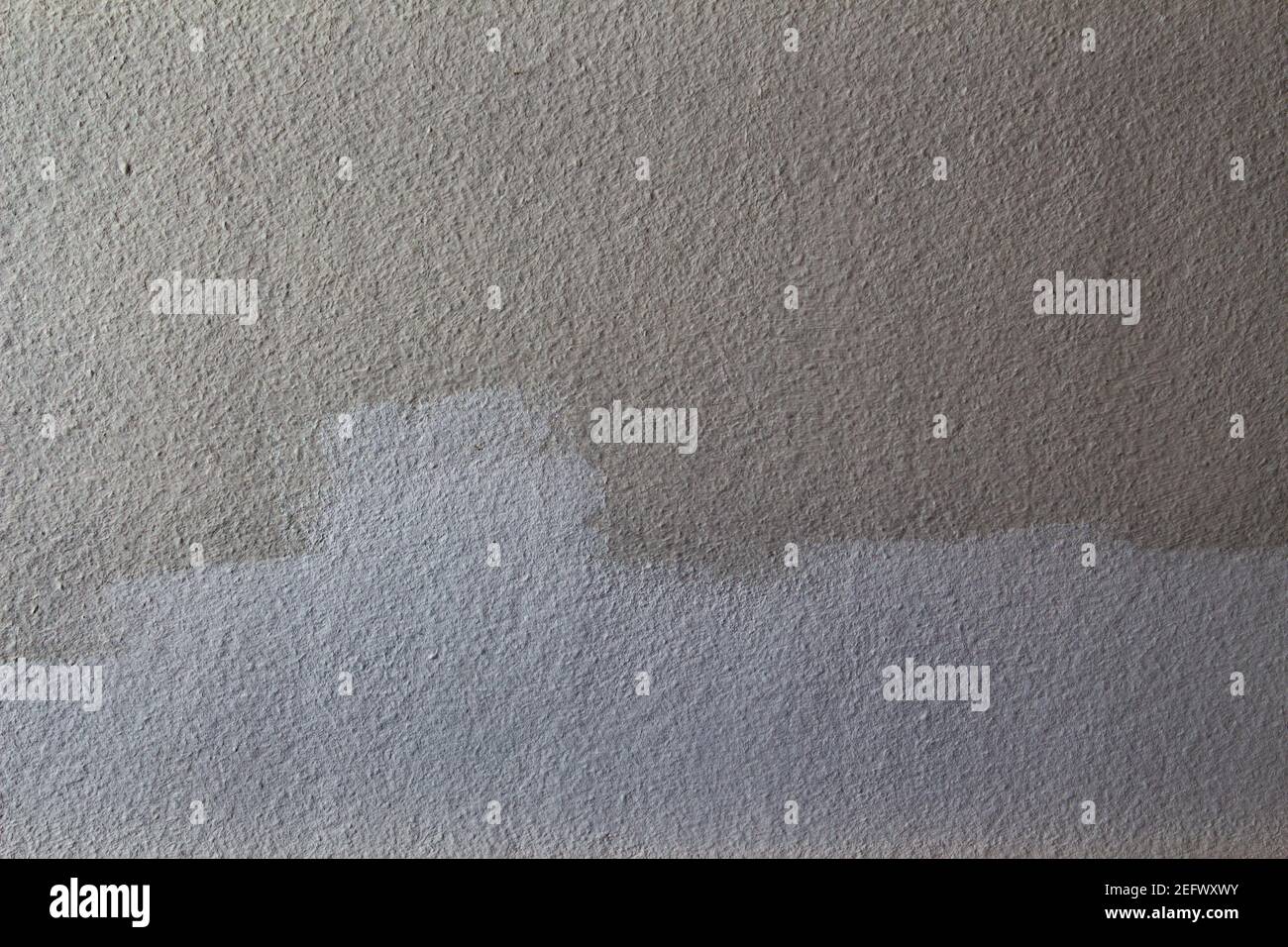 Partially painted wall with white paint Stock Photo - Alamy