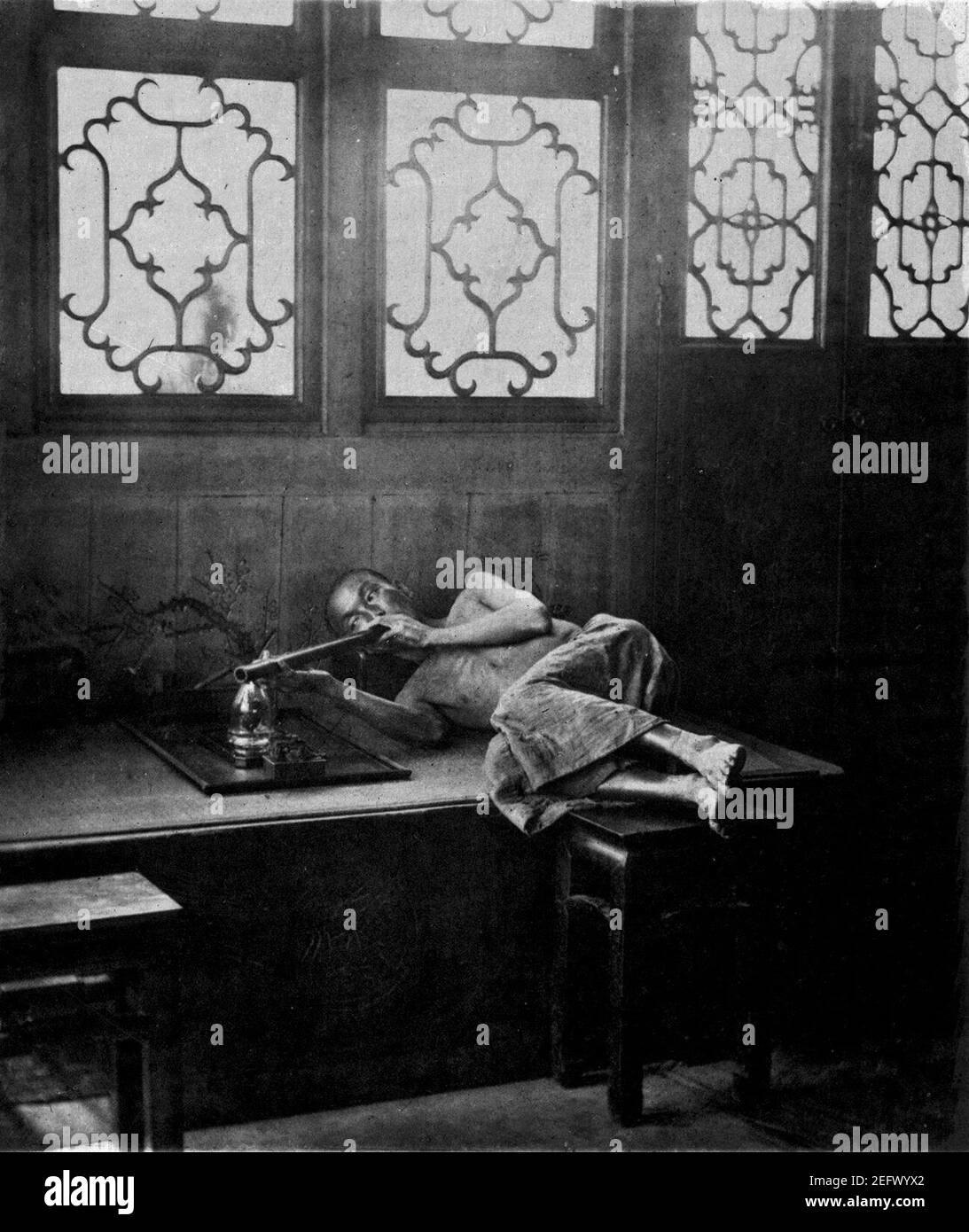 OPIUM-SMOKING IN A RESTAURANT Stock Photo - Alamy