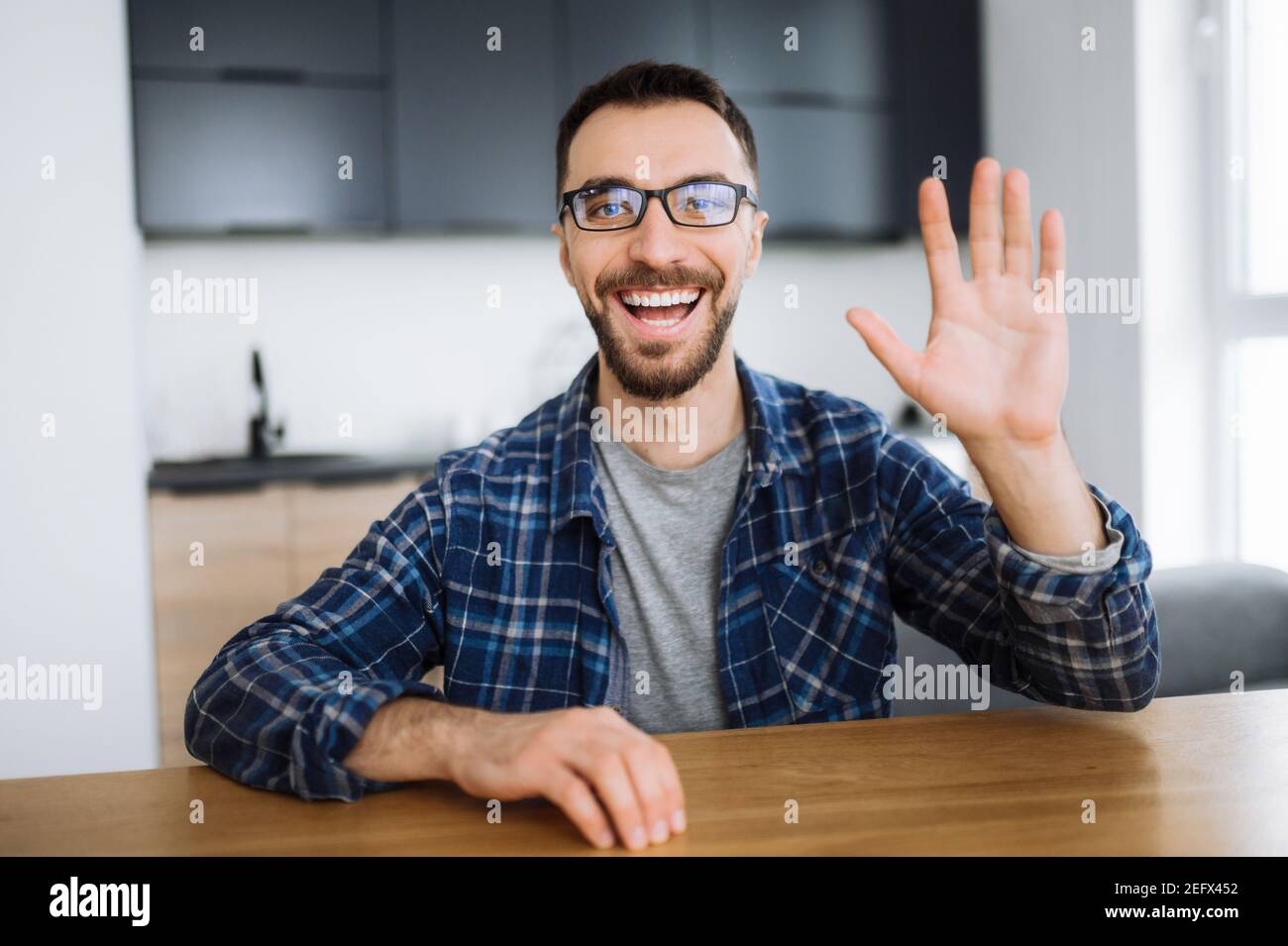 Waving hand to colleagues hi-res stock photography and images - Alamy